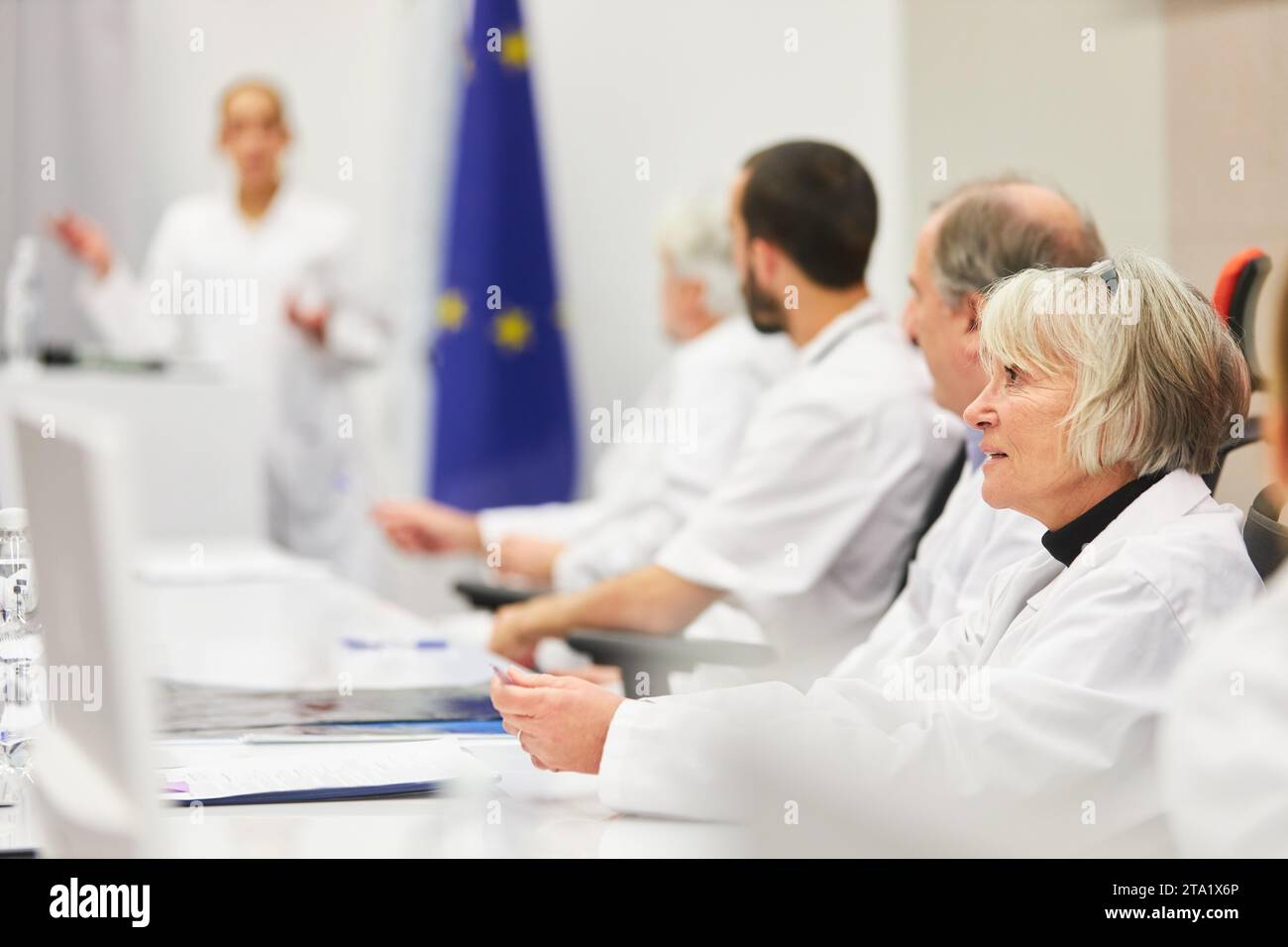Speaker panel with male and female doctors at medical health care ...