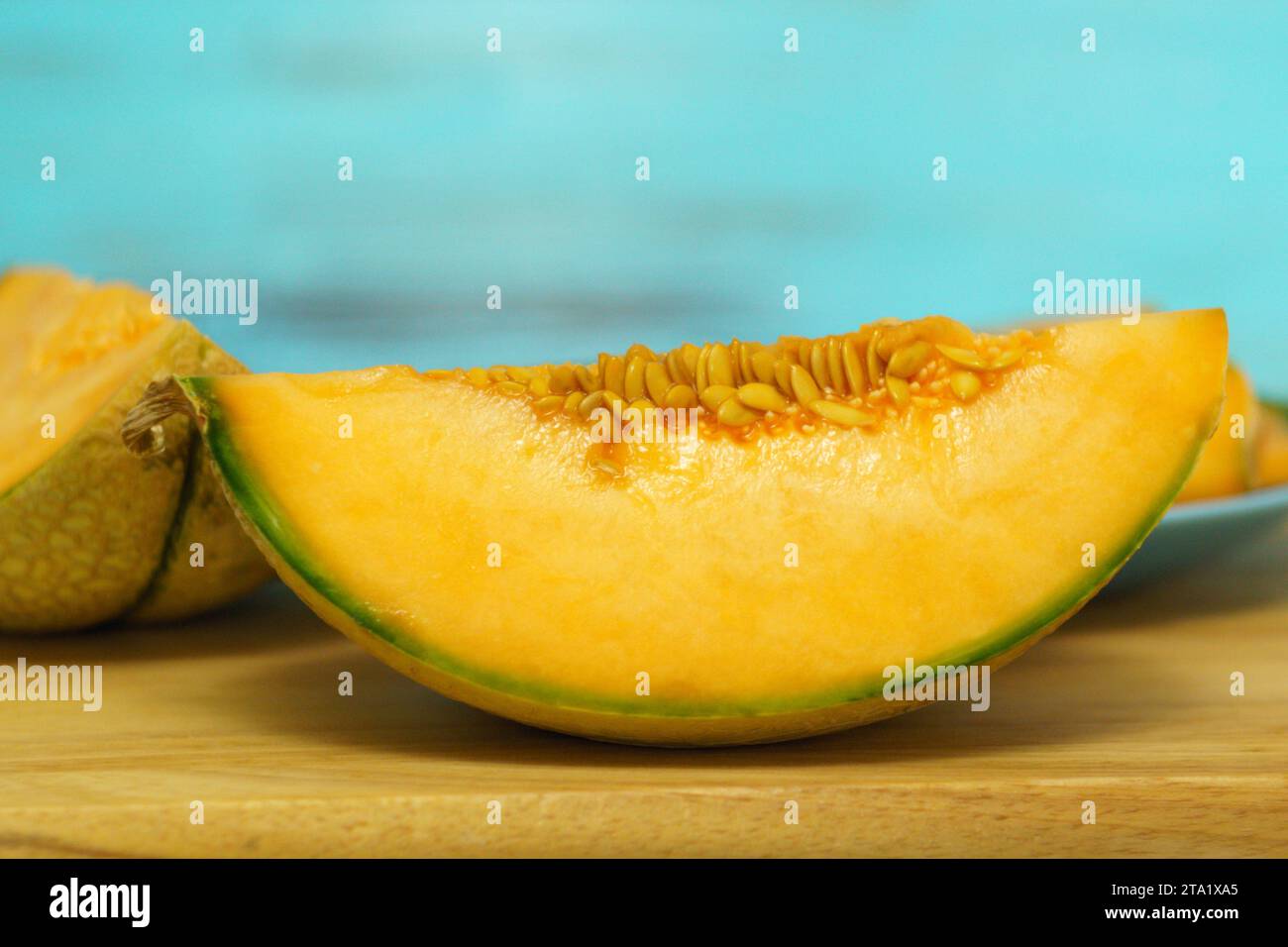 Melon close-up cut. Cooking food in the kitchen in summer Stock Photo ...