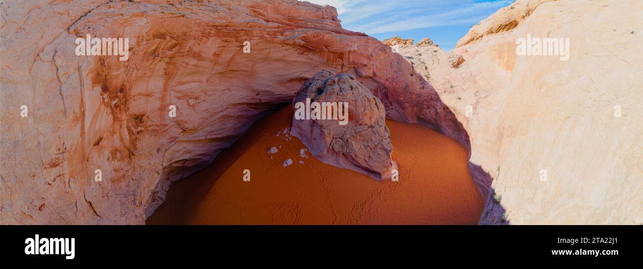 Panoramic photograph of the Cosmic Ashtray, a uniquely eroded sandstone ...