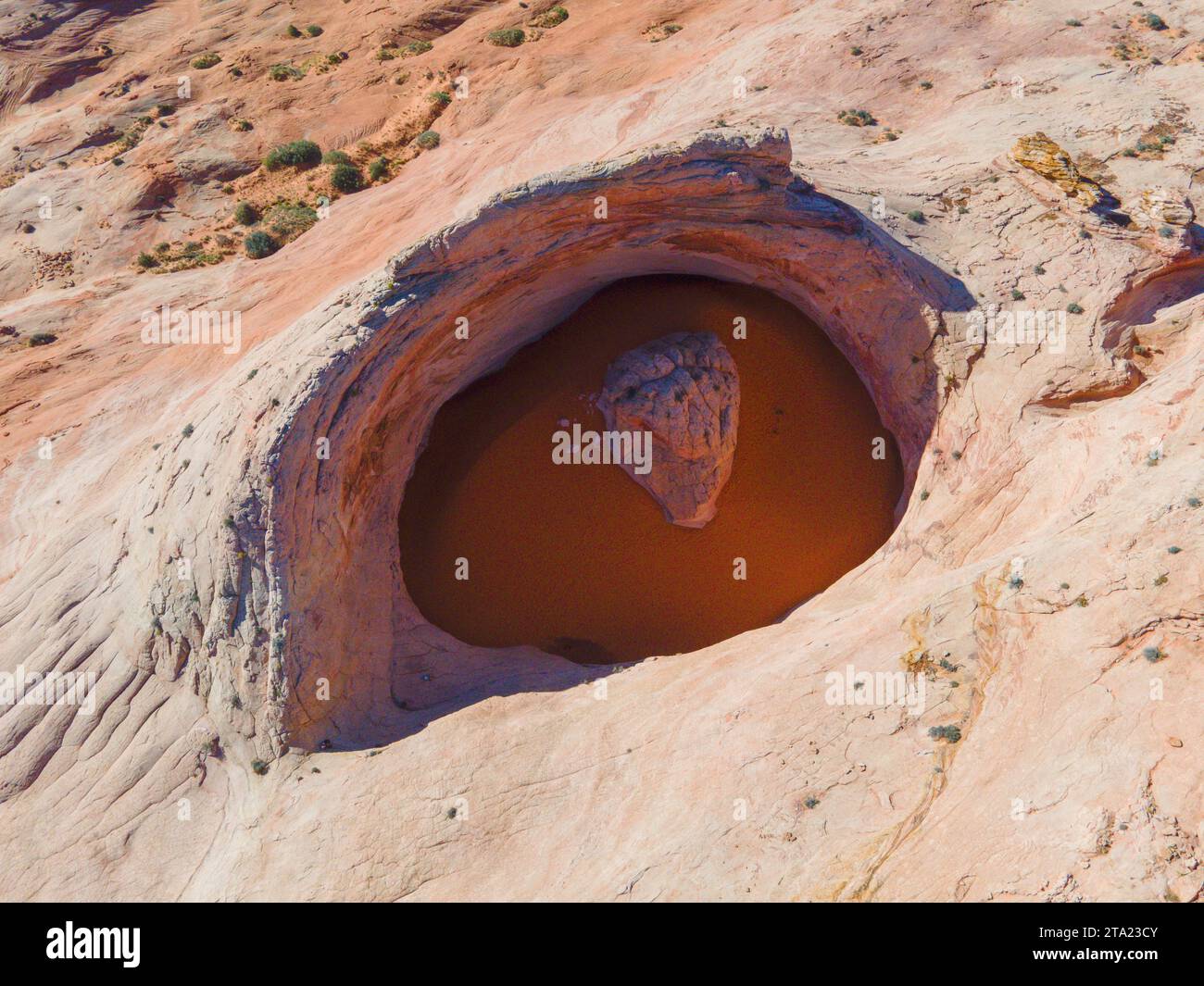 Photograph of the Cosmic Ashtray, a uniquely eroded sandstone formation ...