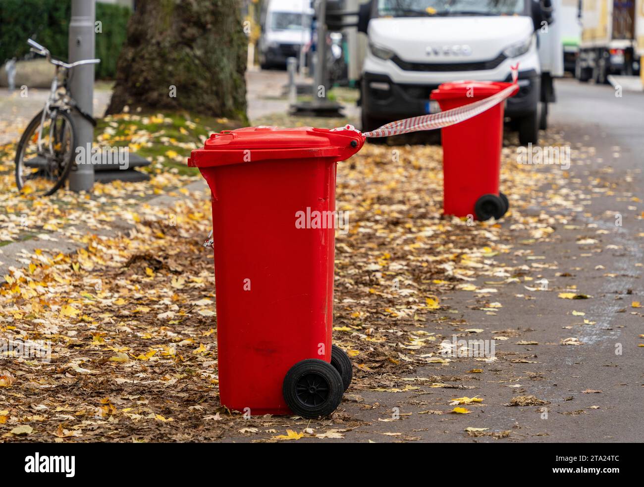 Barrier, red rubbish bins with red and white barrier tape, Berlin ...