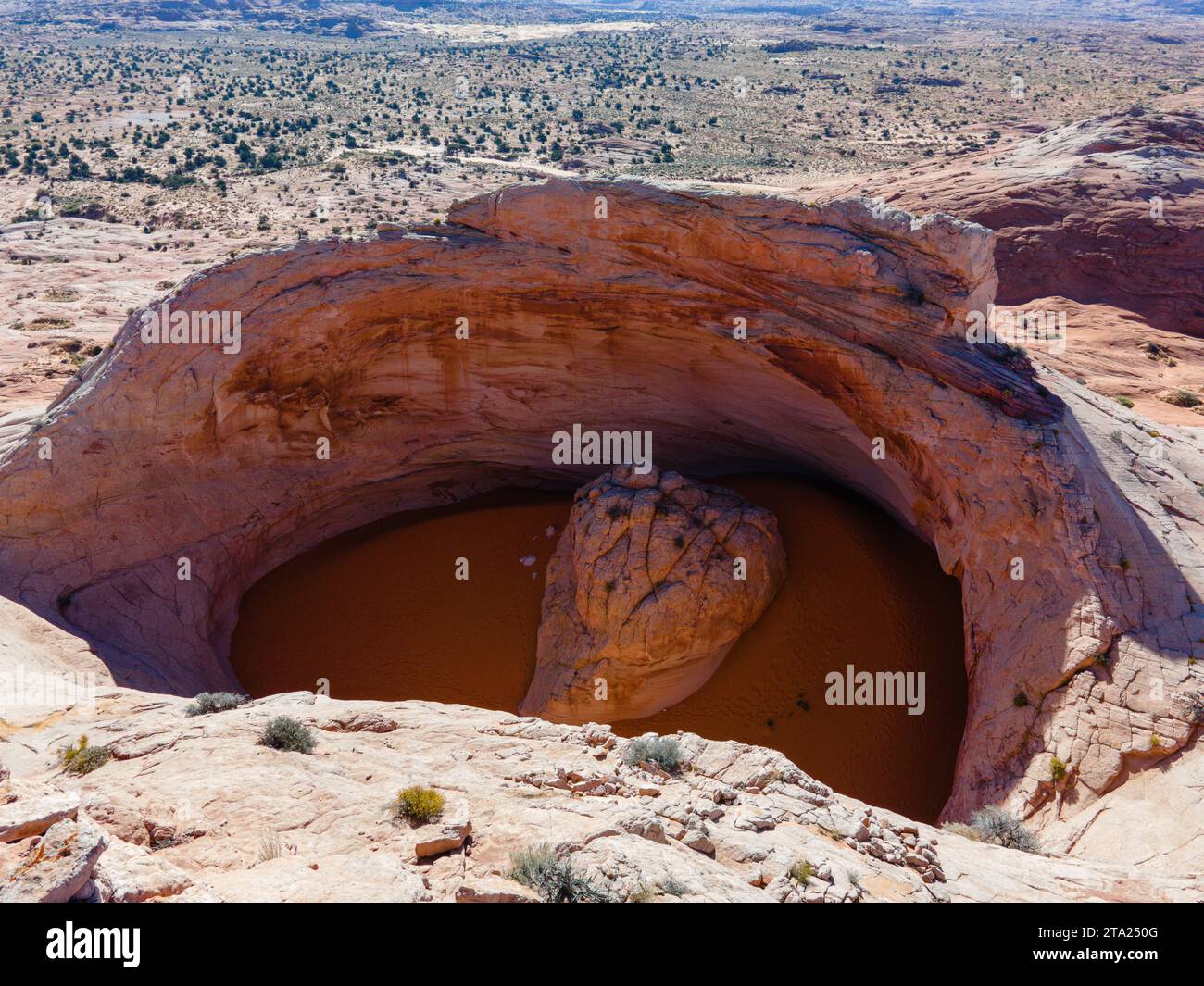Photograph of the Cosmic Ashtray, a uniquely eroded sandstone formation ...