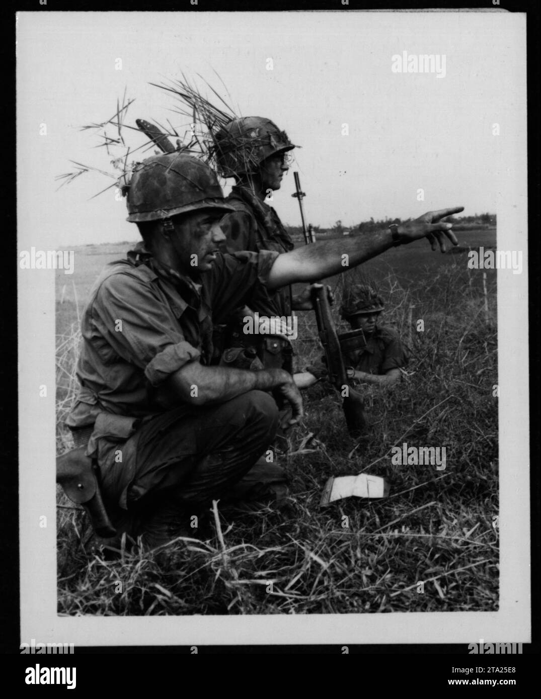 Soldiers engaged in combat during the Vietnam War in January 1966. The ...