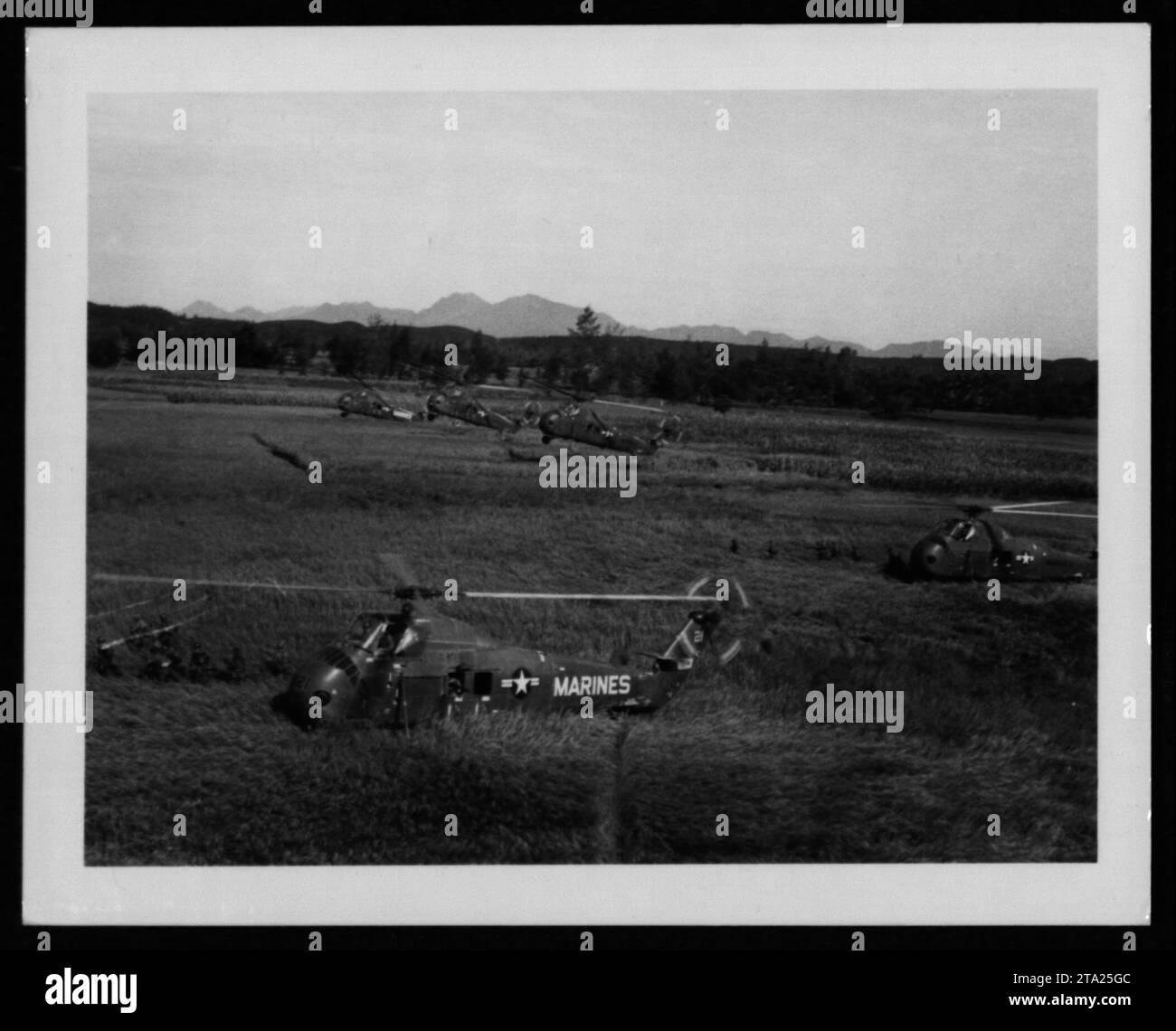 Marines aboard UH-34 helicopters during a military operation in Vietnam ...