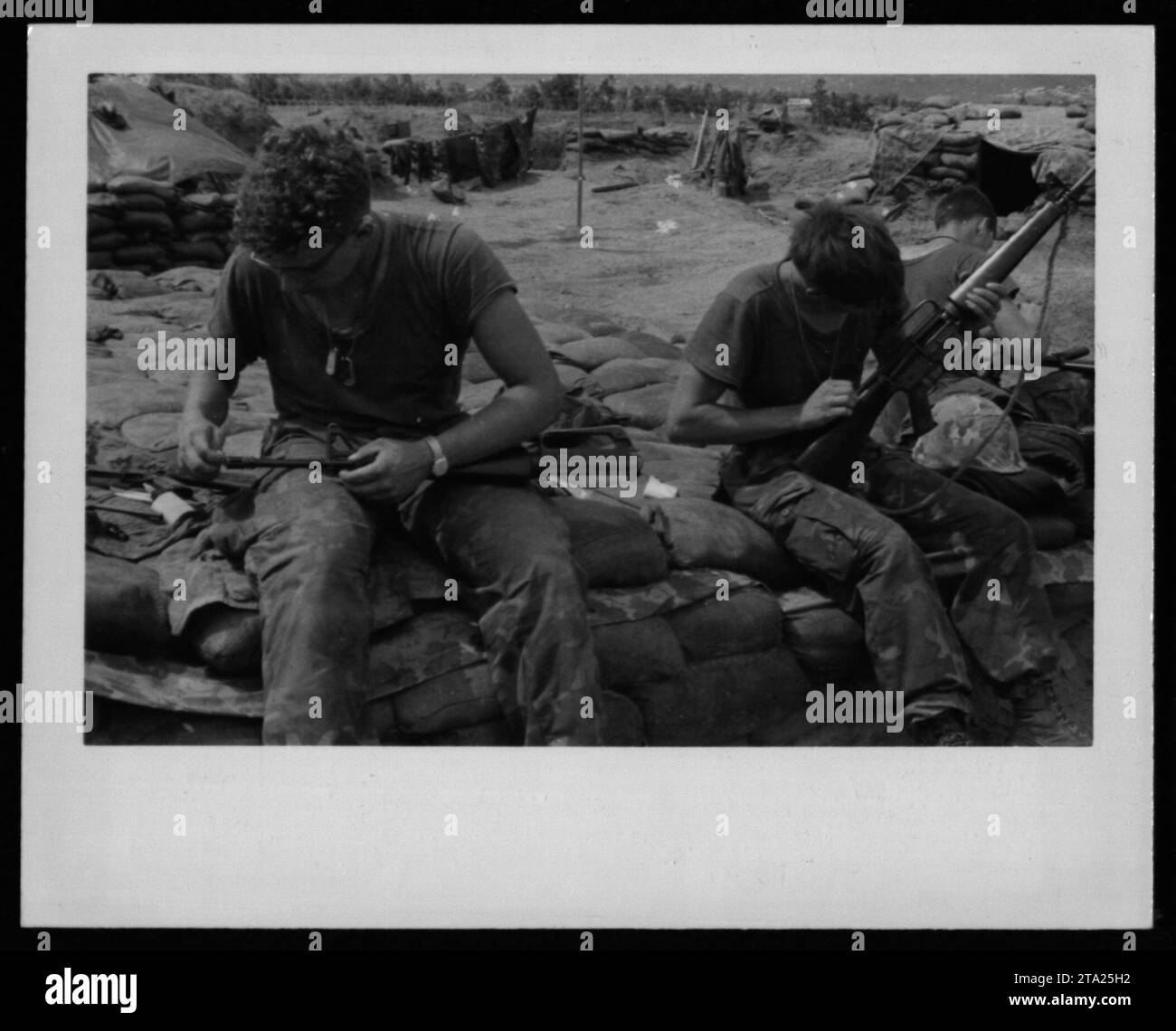 On October 30, 1969, soldiers in Vietnam perform maintenance on ...