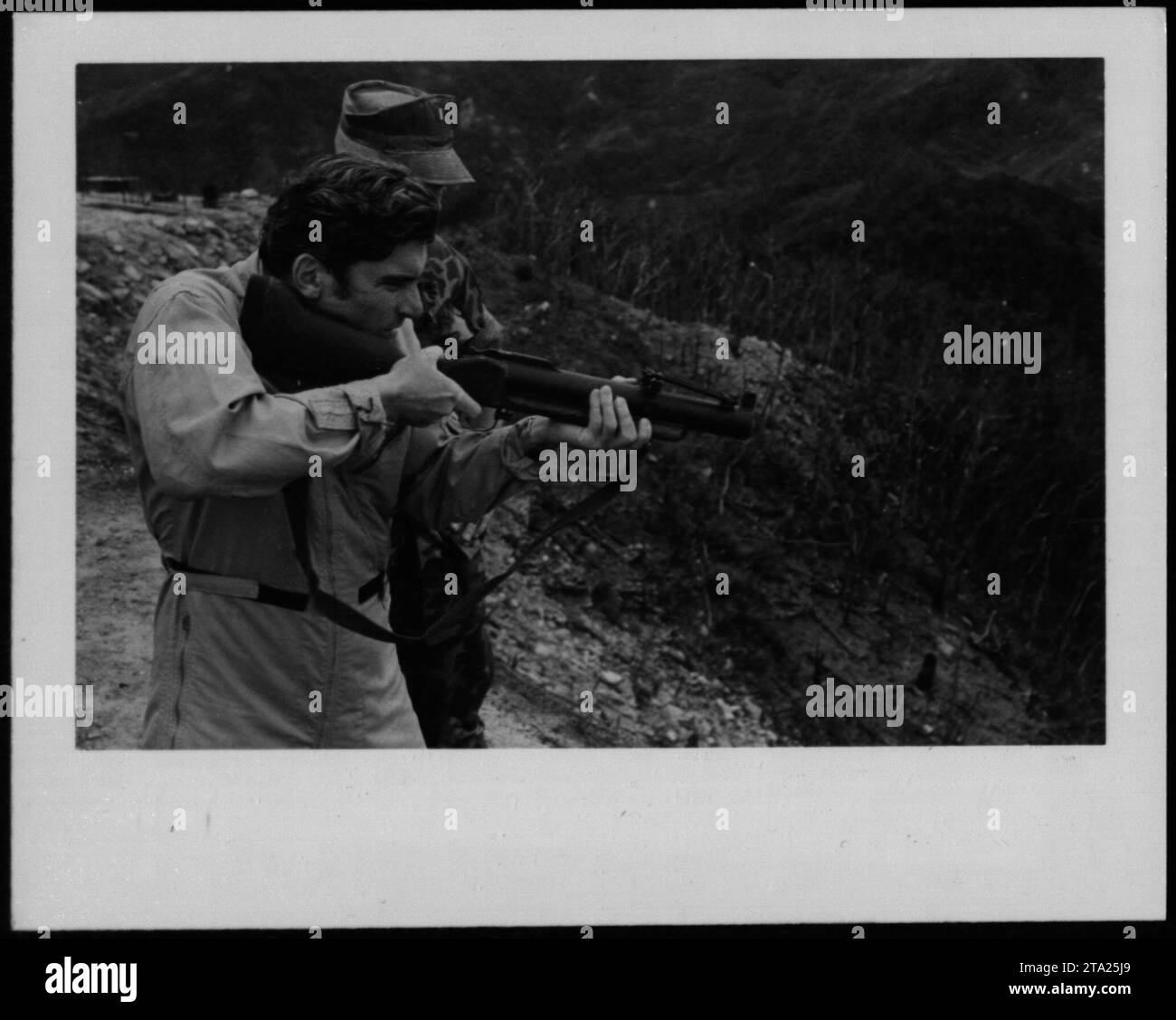 American military officers review a strategic plan during the Vietnam ...