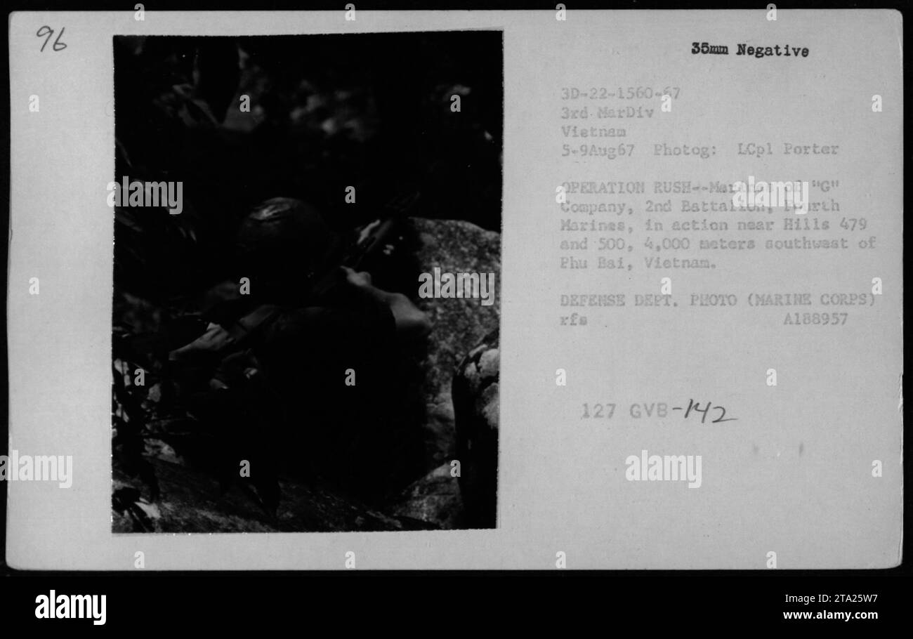 Marines from "G" Company, 2nd Battalion, Fourth Marines, engaged in ...