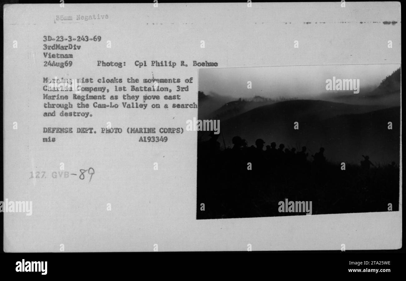 Charlie Company, 1st Battalion, 3rd Marine Regiment moving stealthily ...