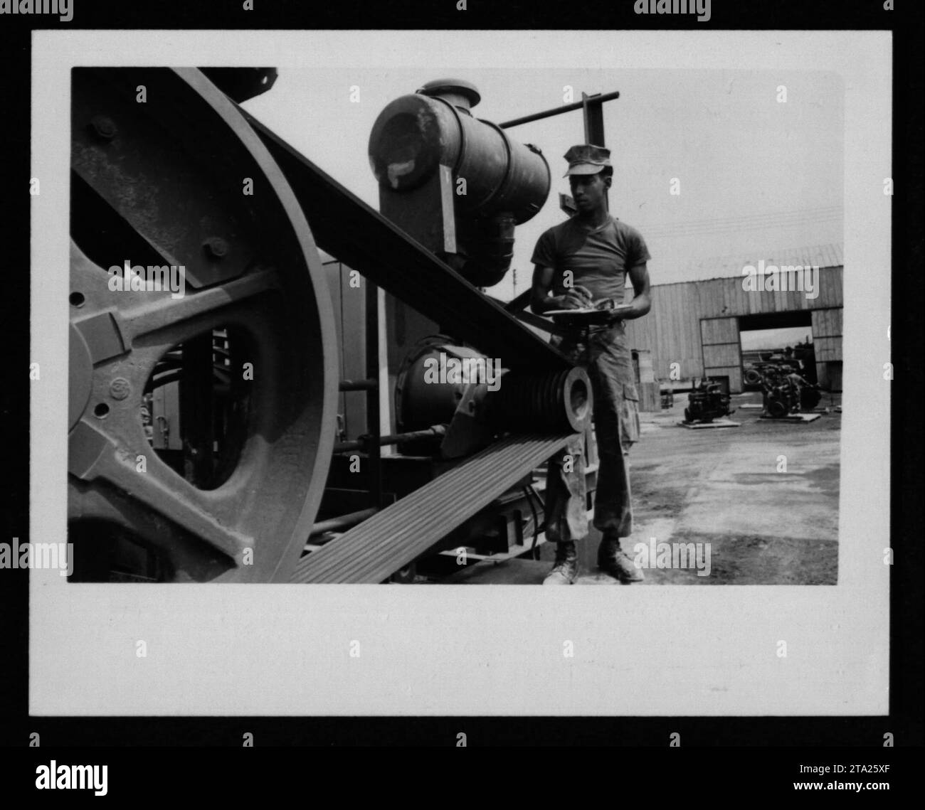 American soldiers perform maintenance on vehicles and equipment during ...
