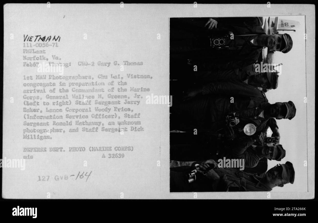 Combat photographers prepare for the arrival of General Wallace M ...