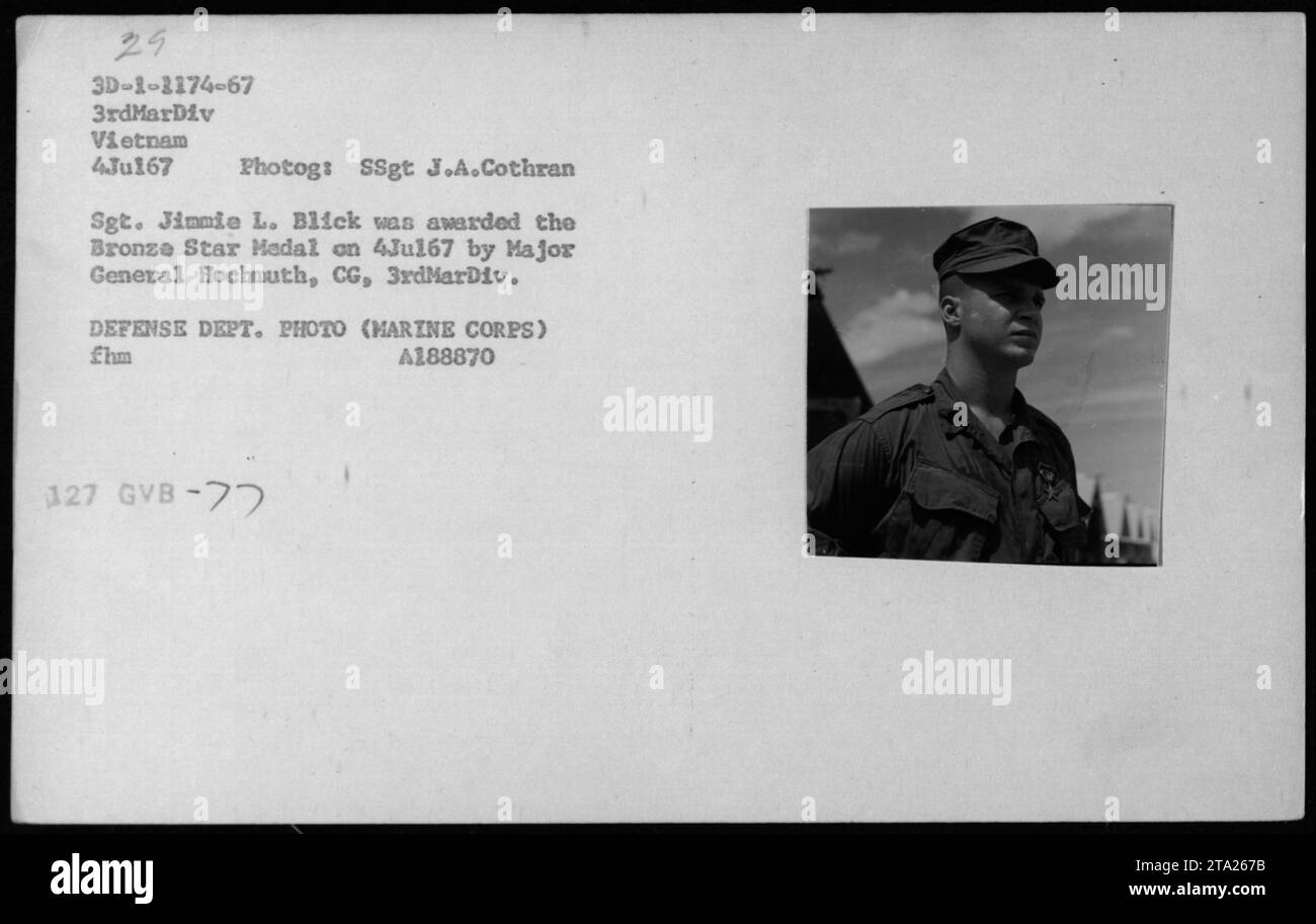 Major General Hochmuth awarding the Bronze Star Medal to Sgt. Jimmie L ...