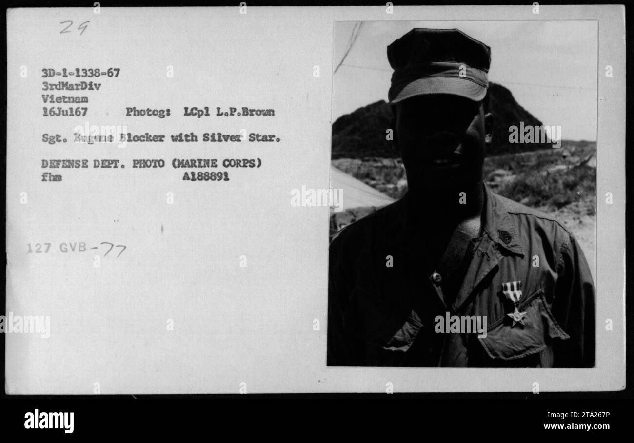 Sgt. Eugene Blocker is seen being presented with the Silver Star medal ...