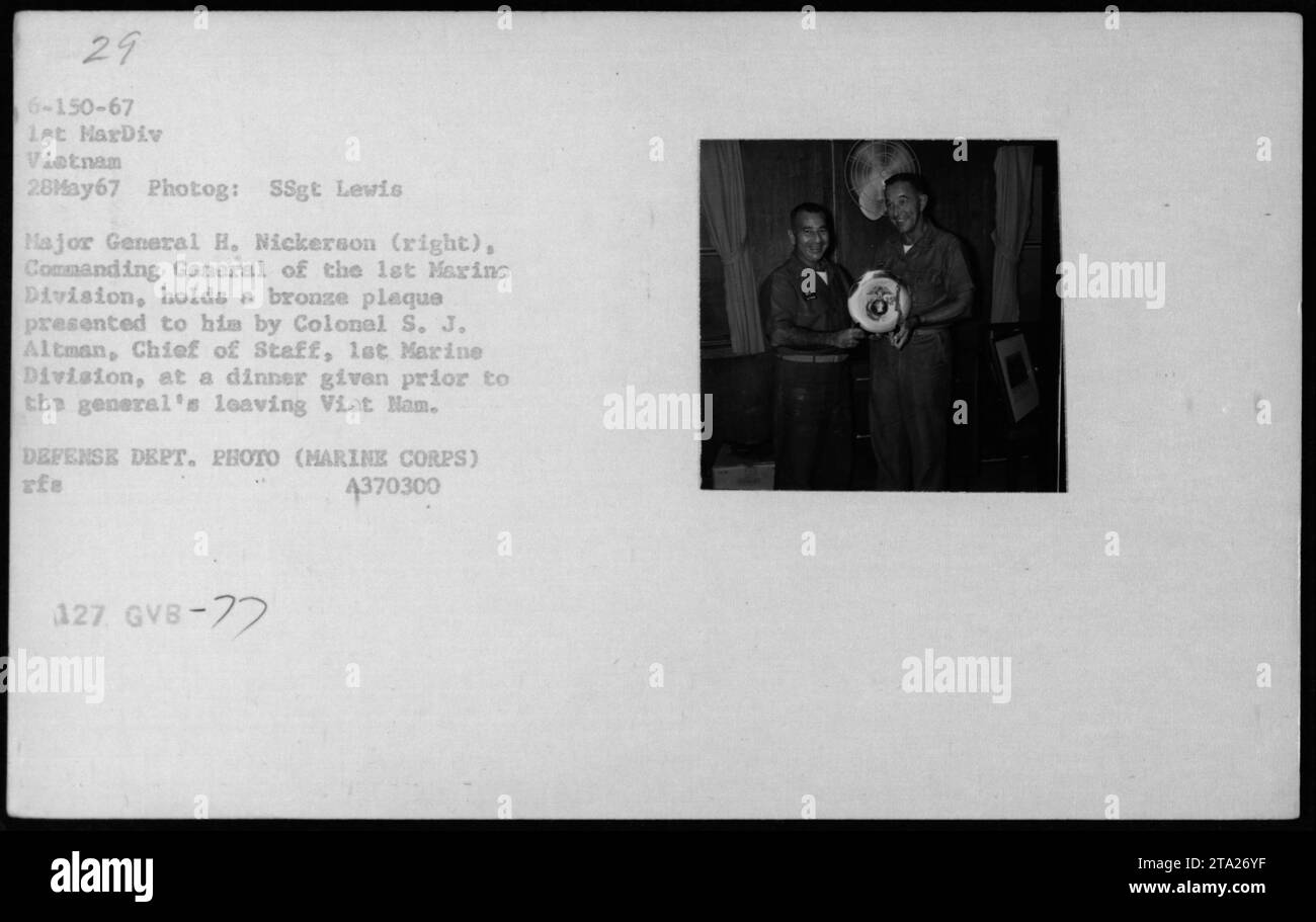 "Major General H. Nickerson of the 1st Marine Division receives a ...