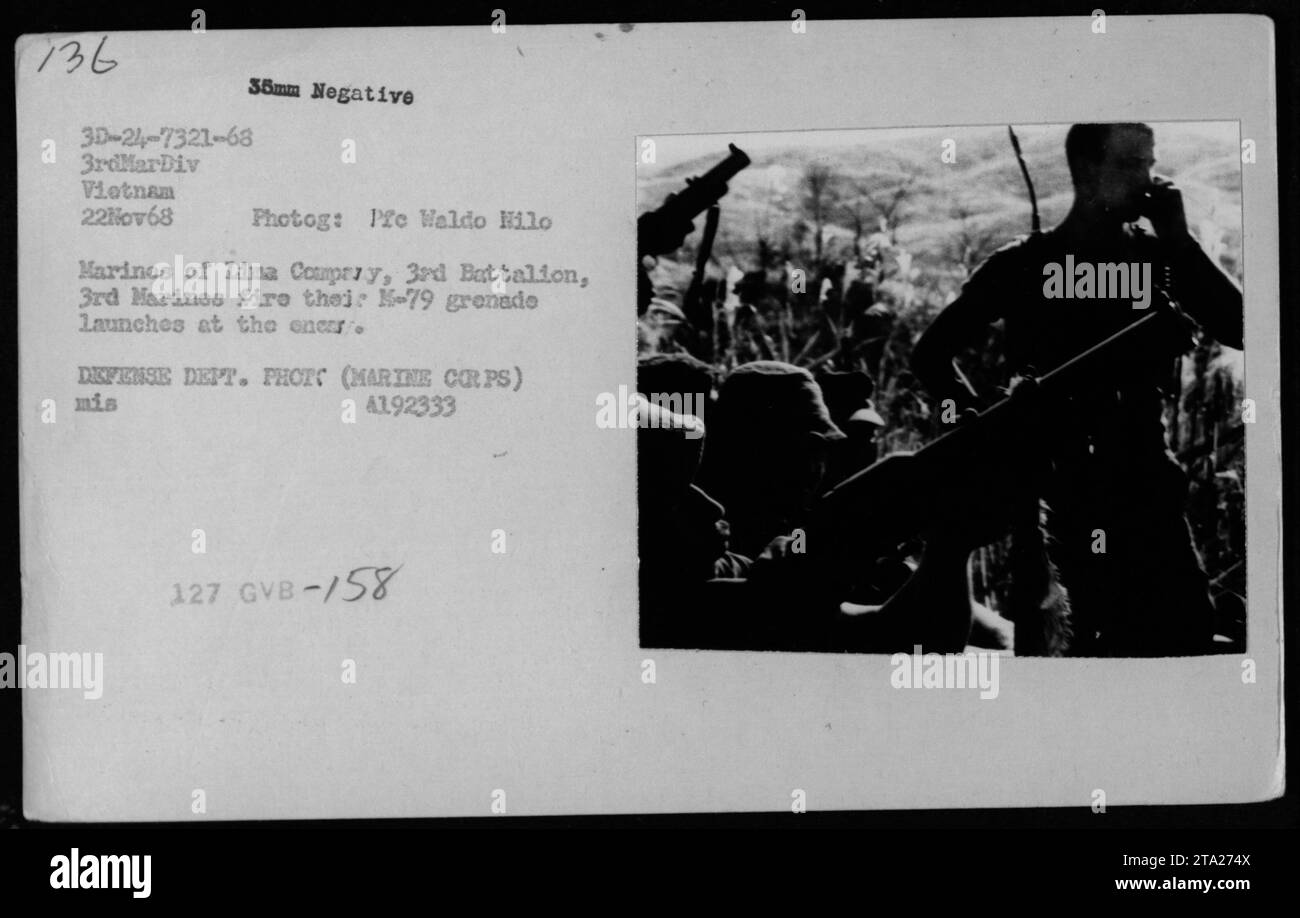 Marines from the 3rd Battalion, 3rd Marines are seen firing their K-79 ...
