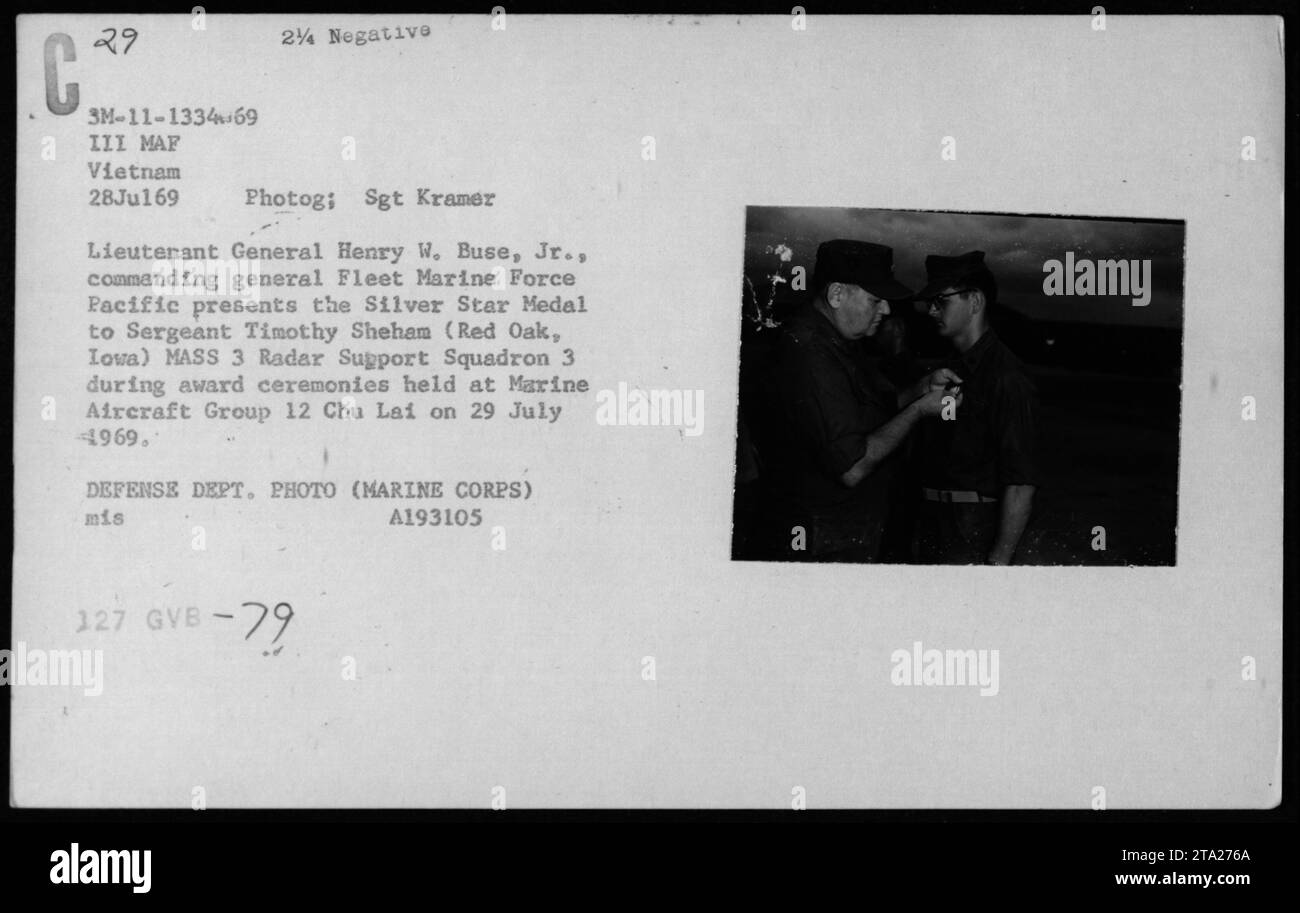 Lieutenant General Henry W. Buse, Jr., presents the Silver Star Medal ...