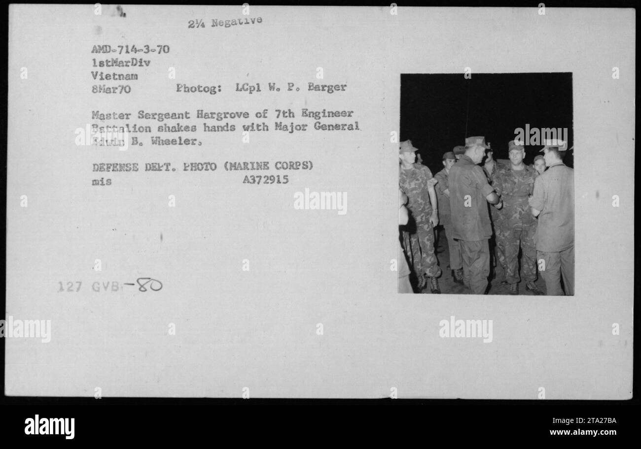 Master Sergeant Hargrove from the 7th Engineer Battalion shaking hands ...