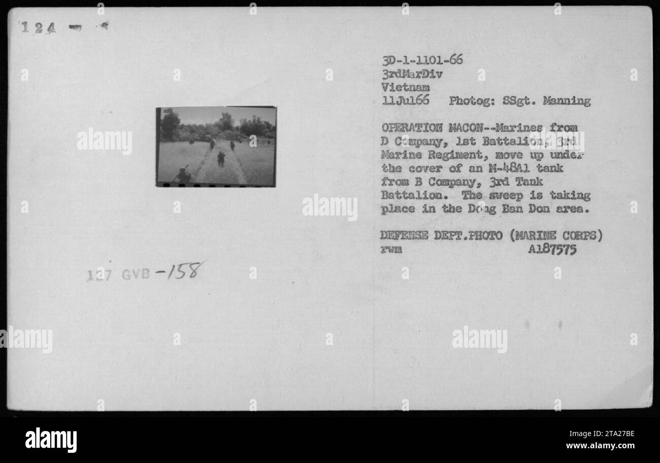 Marines from D Company, 1st Battalion, 3rd Marine Regiment, moving with ...