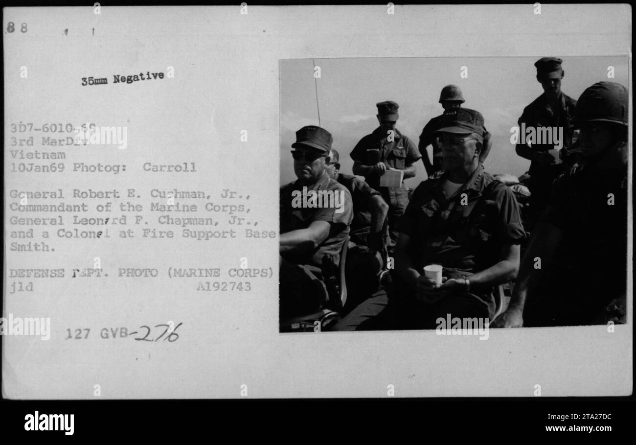 Marine Corps officials, including General Robert E. Cushman Jr. and ...