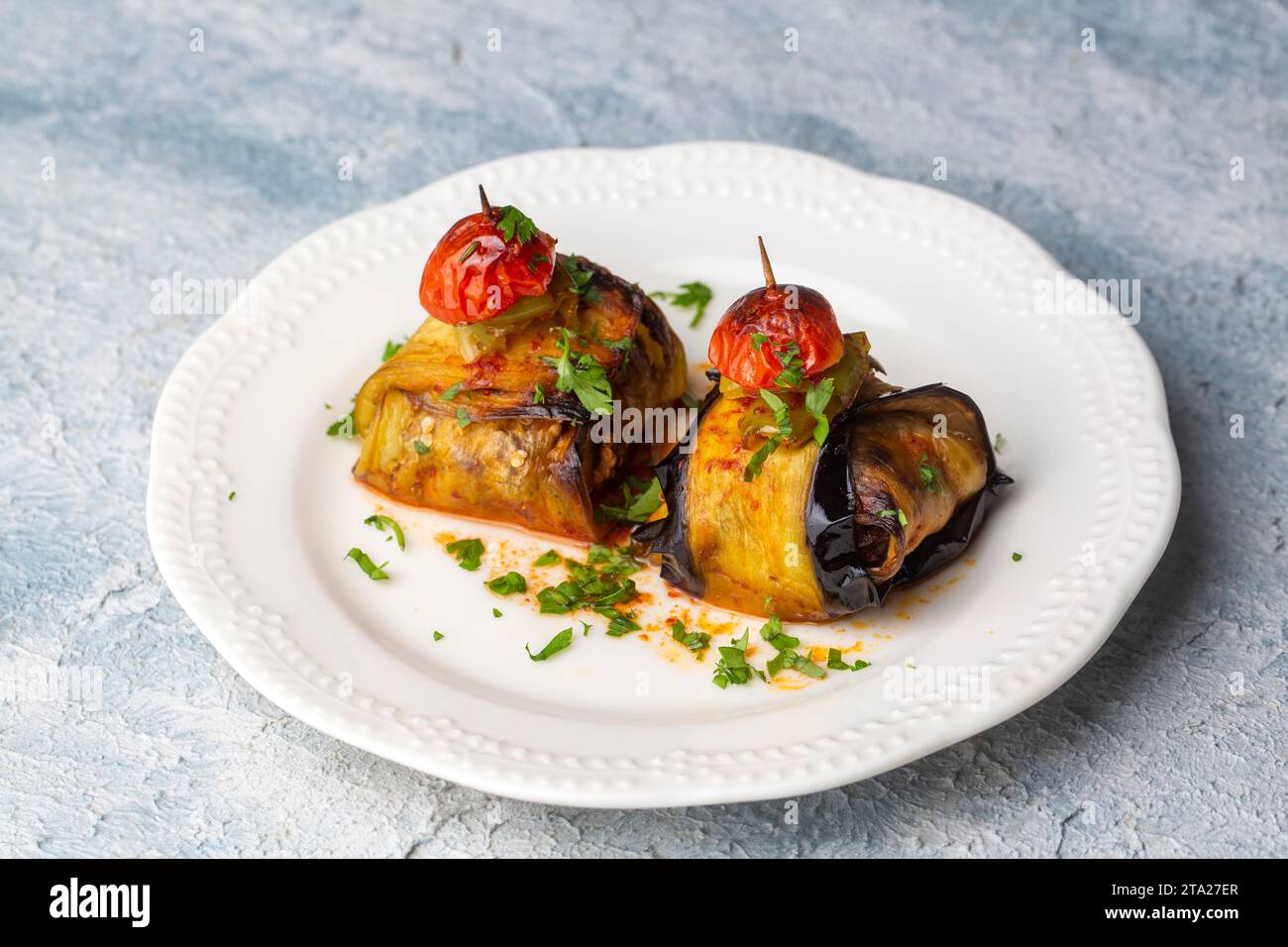 Traditional delicious Turkish food; Kofte kebab wrapped in eggplant ...