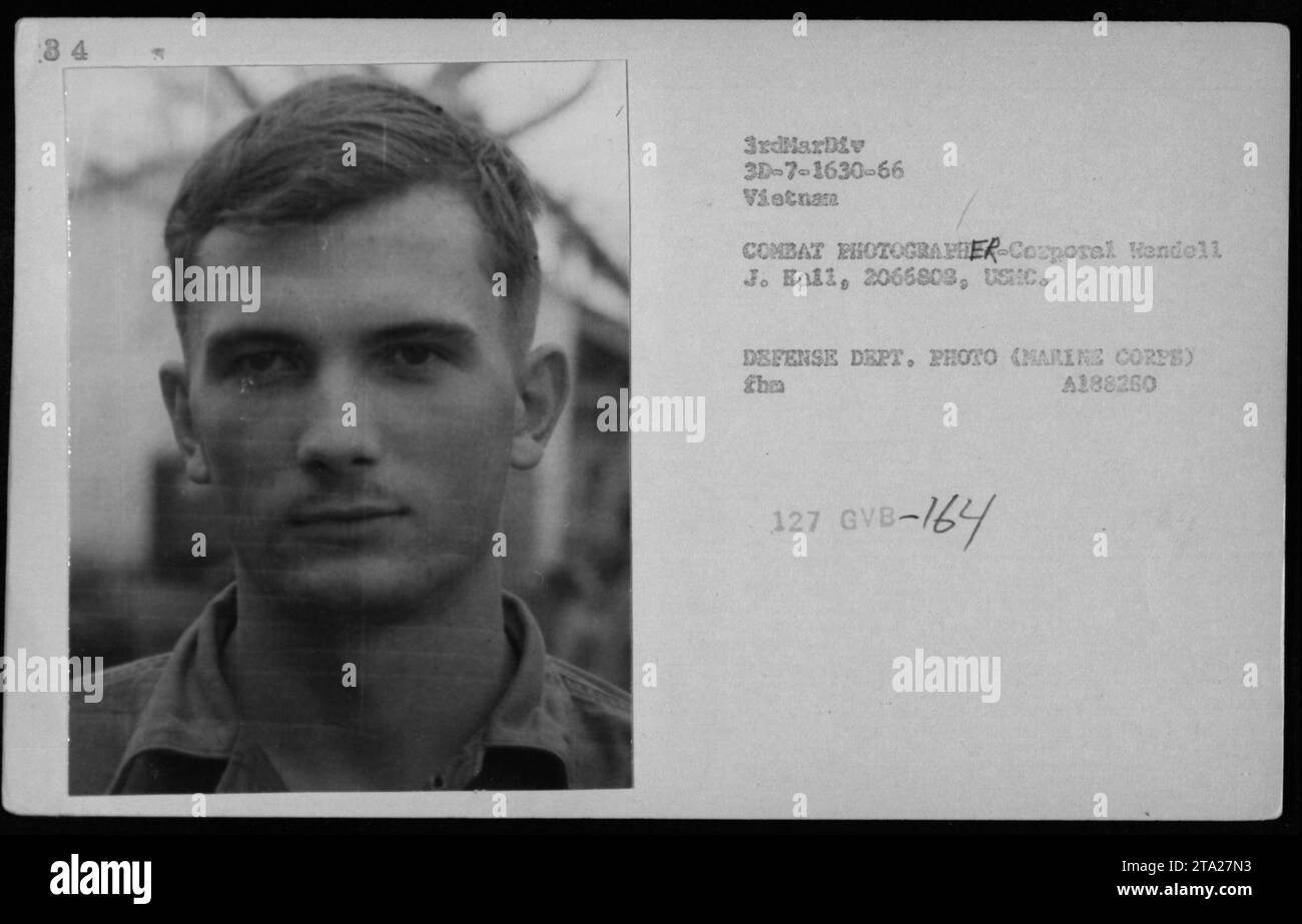 A combat photographer from the 3rd Marine Division of the U.S. Army ...