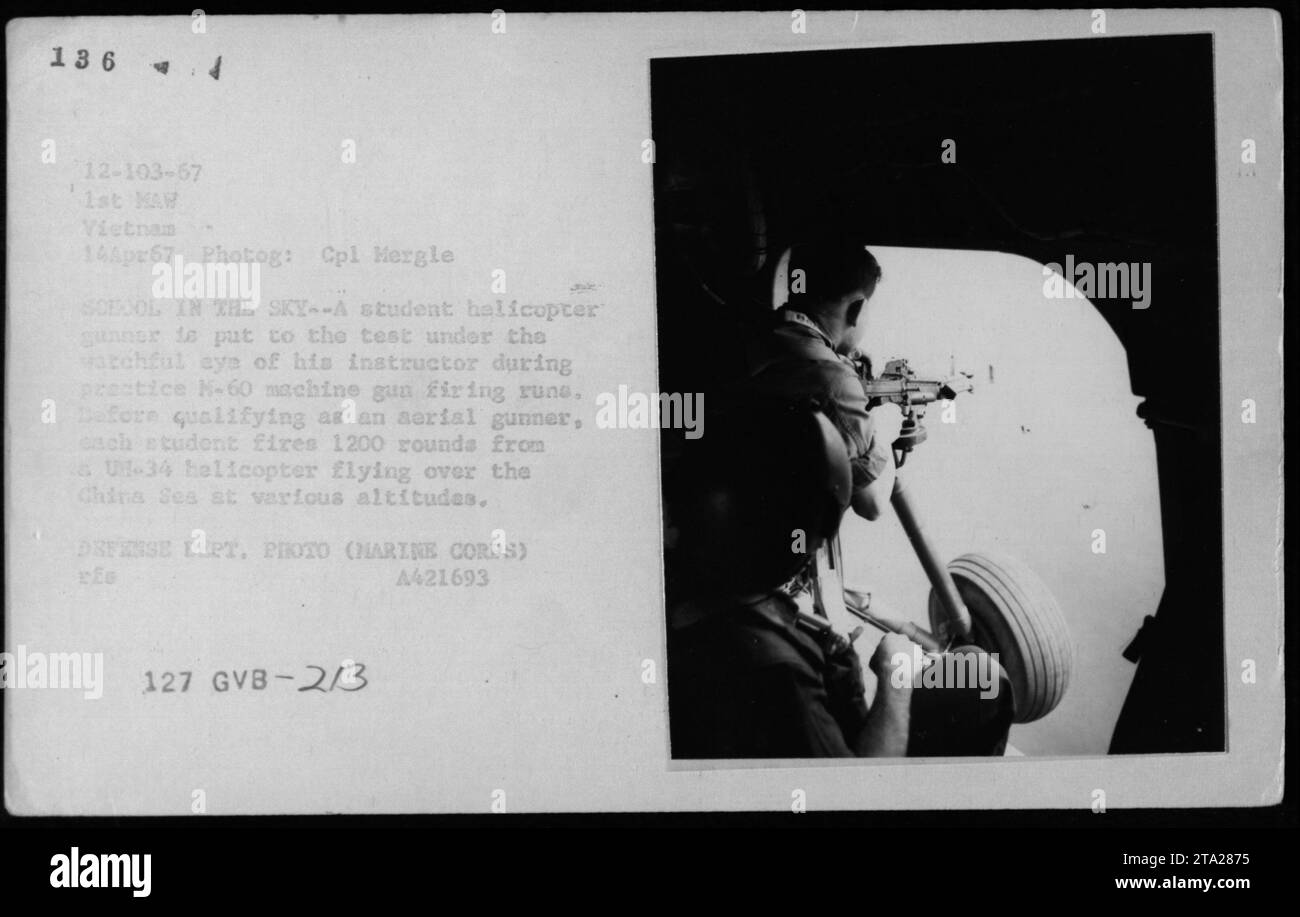 A student helicopter gunner practices M-60 machine gun firing under the ...