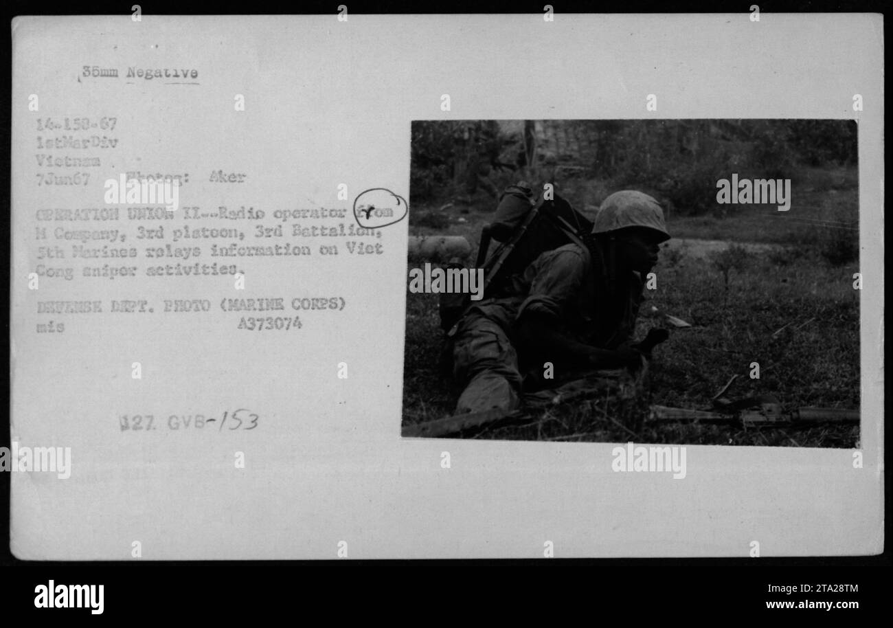 A radio operator from the 1st Marine Division relays information on ...