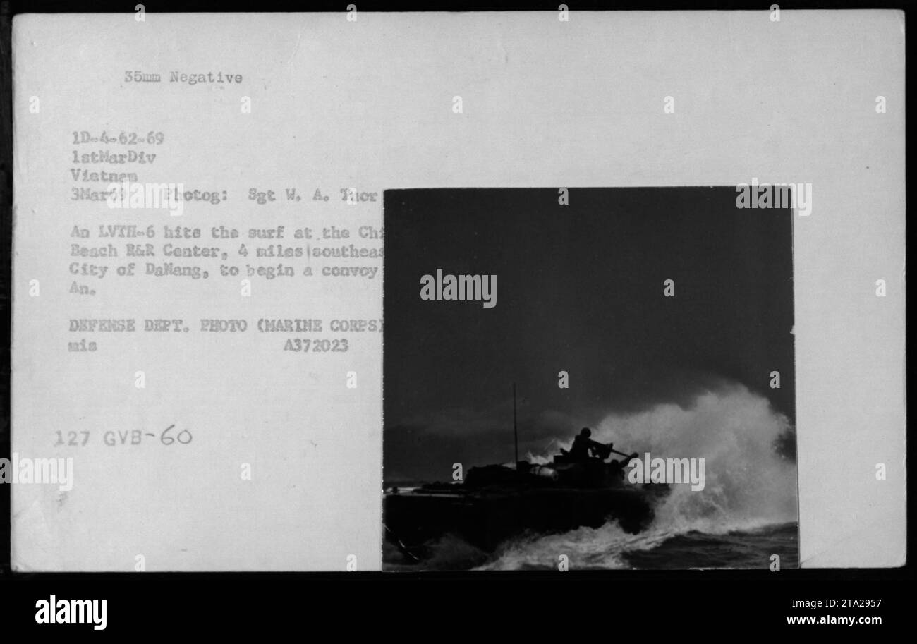 Marines in an LVIH-6 vehicle land at Cha Beach R&R Center, Vietnam ...