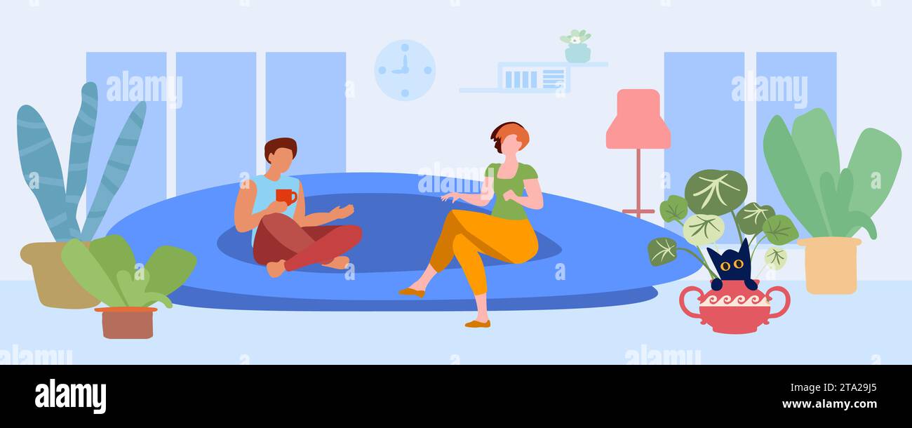 A married couple is sitting on the sofa and talking at living room ...