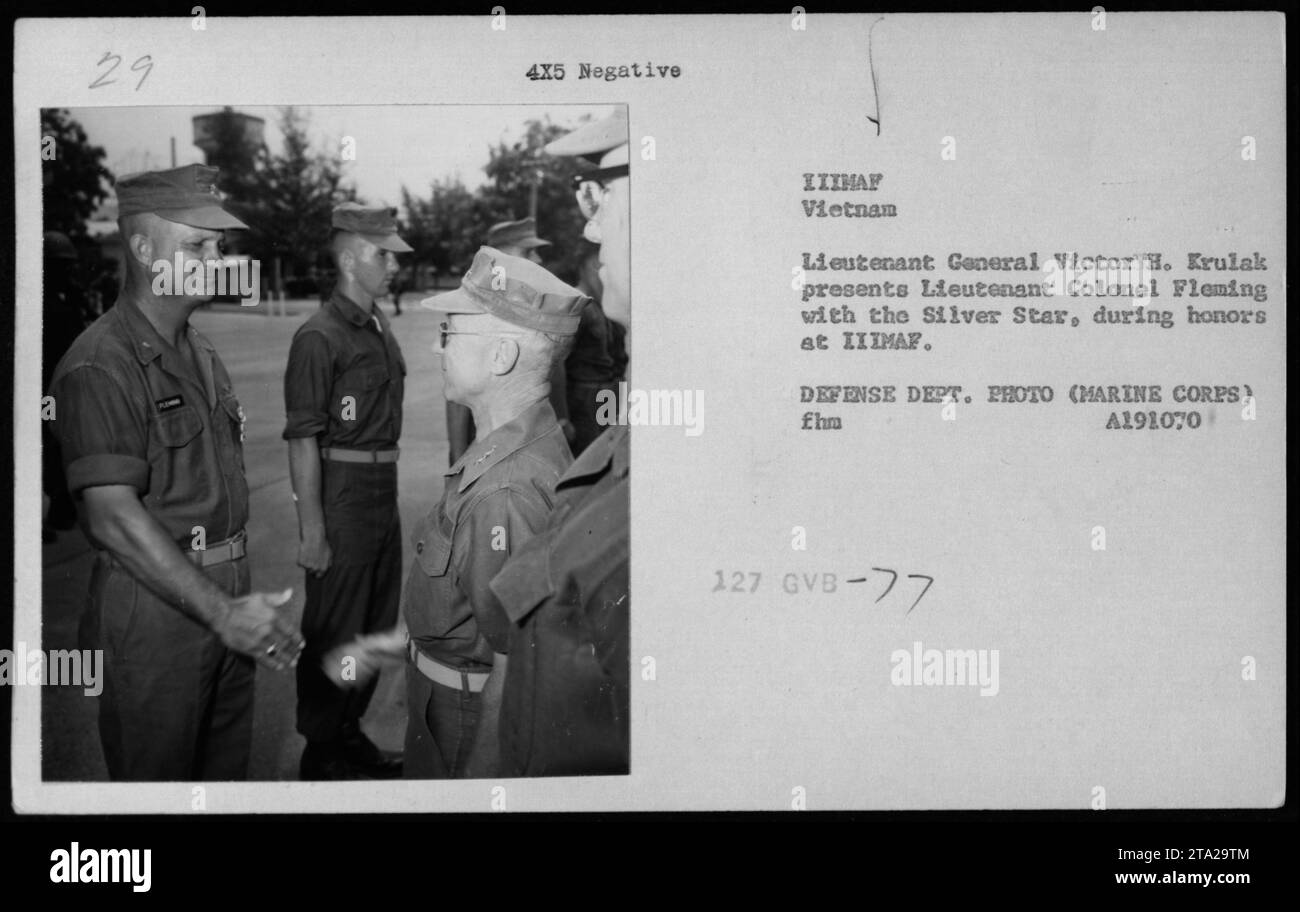 Lieutenant Colonel Fleming receives the Silver Star from Lieutenant ...