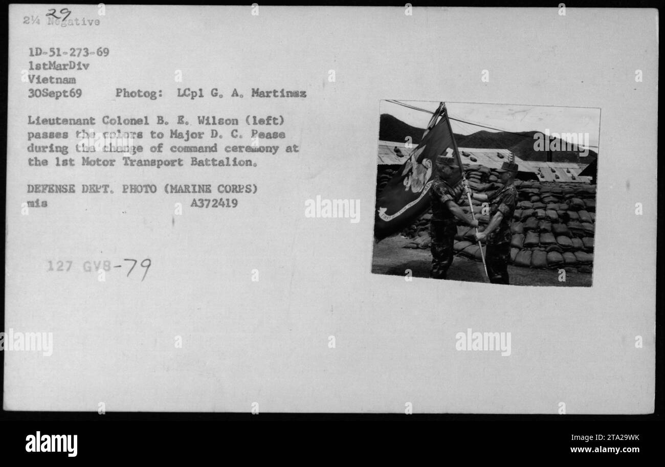 Lieutenant Colonel B. E. Wilson passed the colors to Major D. C. Pease ...