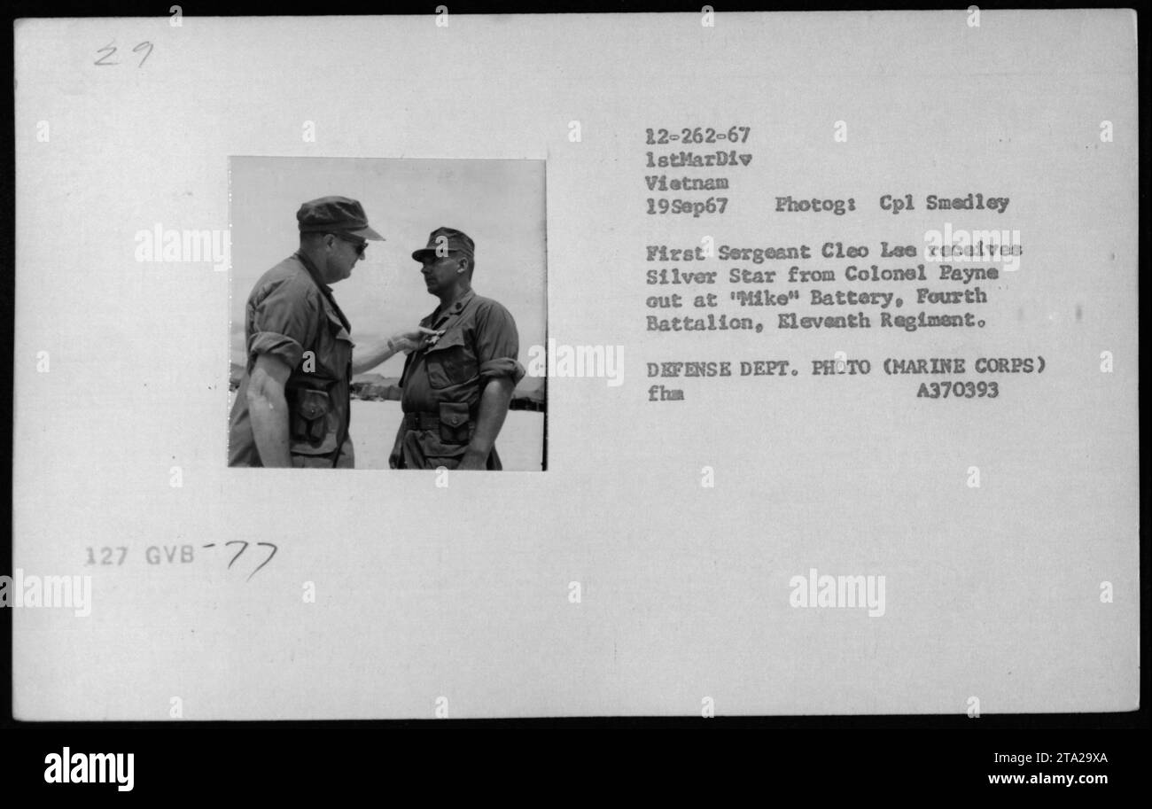 First Sergeant Cleo Lee of the 4th Battalion, 11th Marines receives the ...