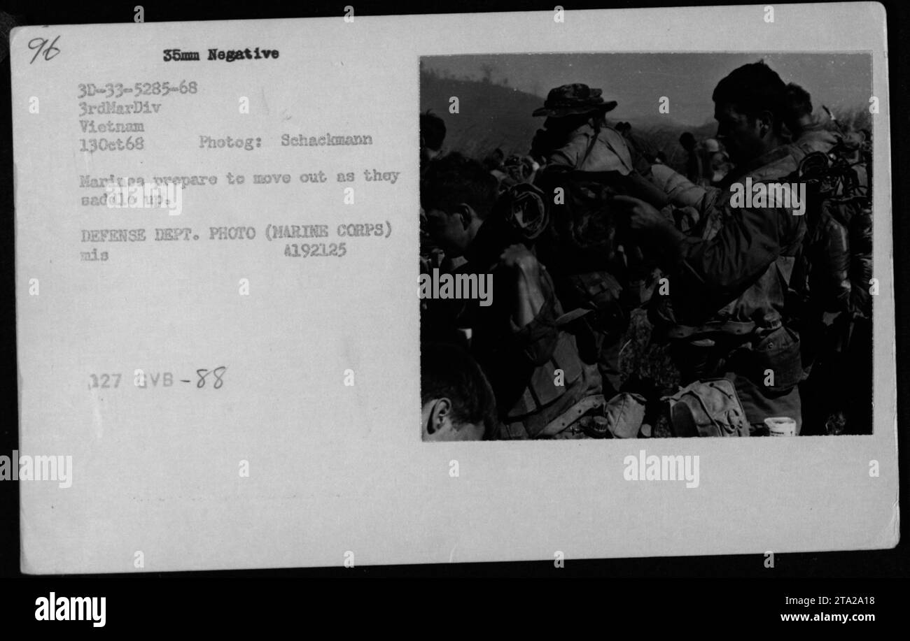 On October 13, 1968, Marines in Vietnam prepared to move out, saddling ...