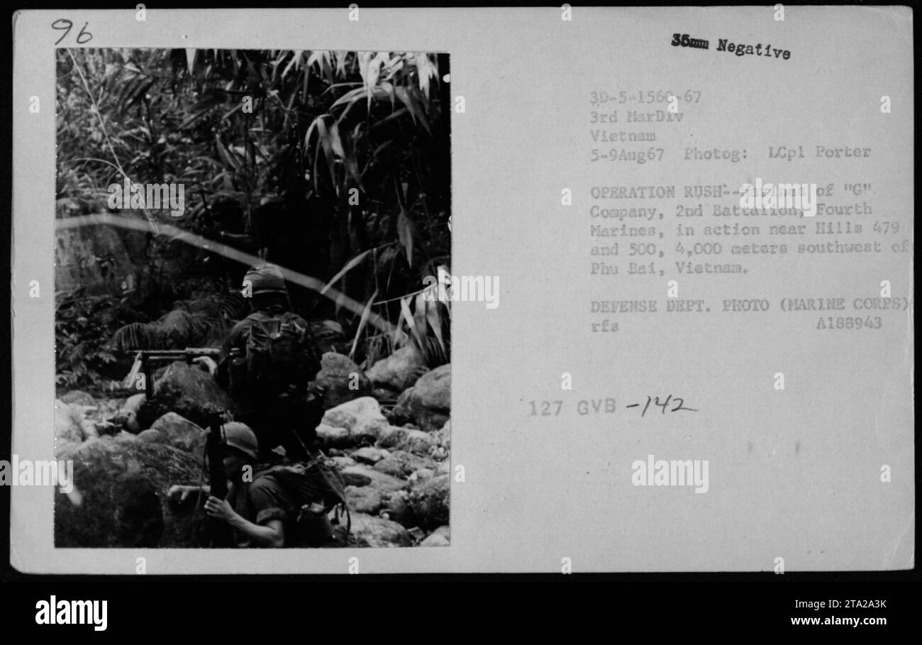 Marines from "G" Company of the 2nd Battalion, 4th Marines engaging in ...