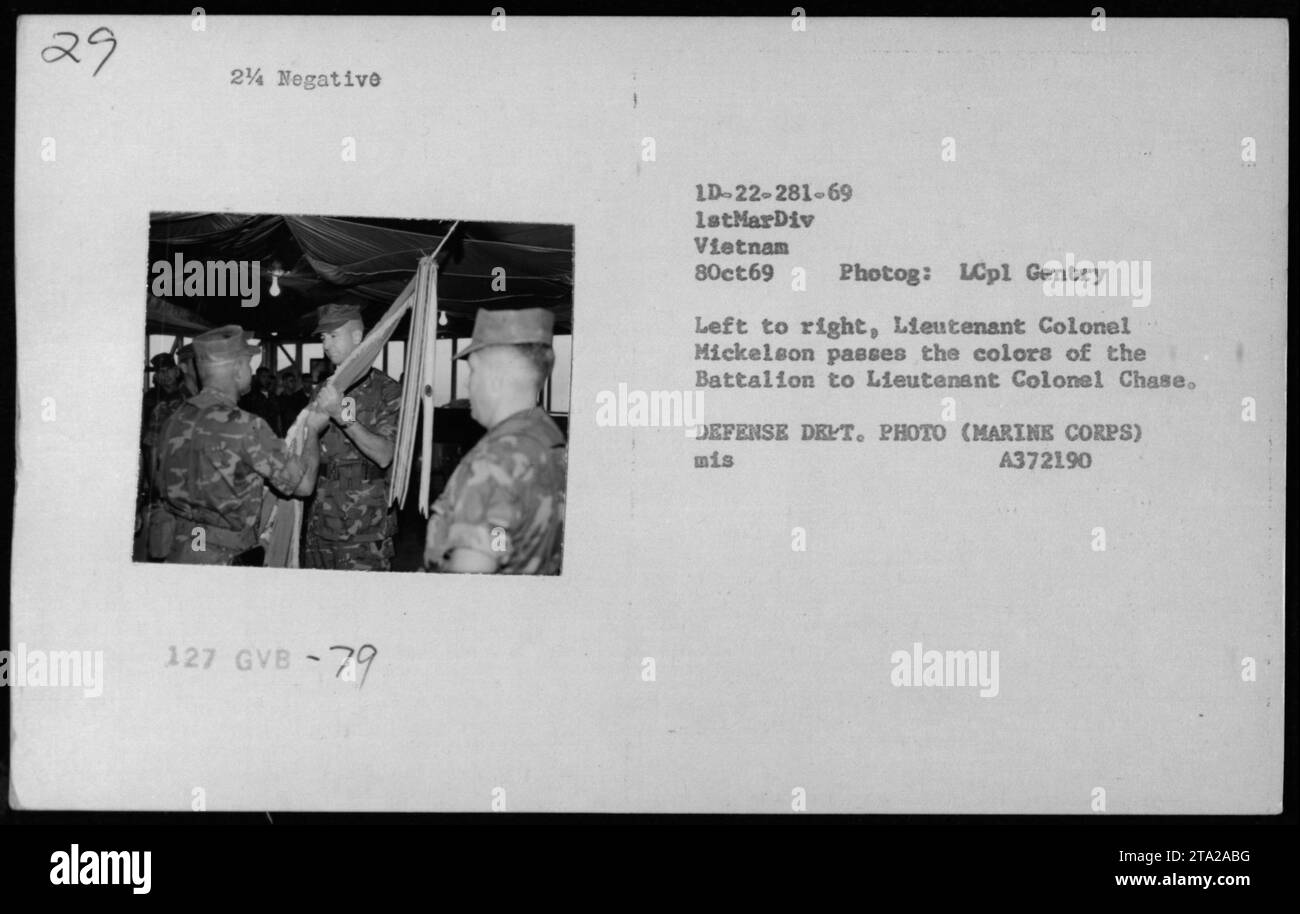 Lieutenant Colonel Mickelson passes the colors of the Battalion to ...