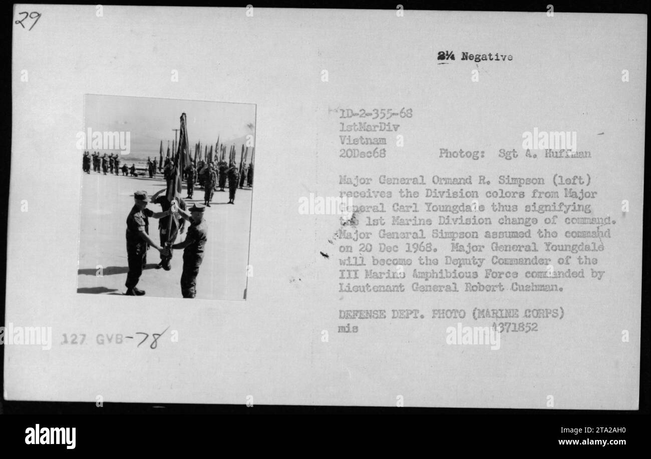 Major General Ormand R. Simpson receives the Division colors from Major ...