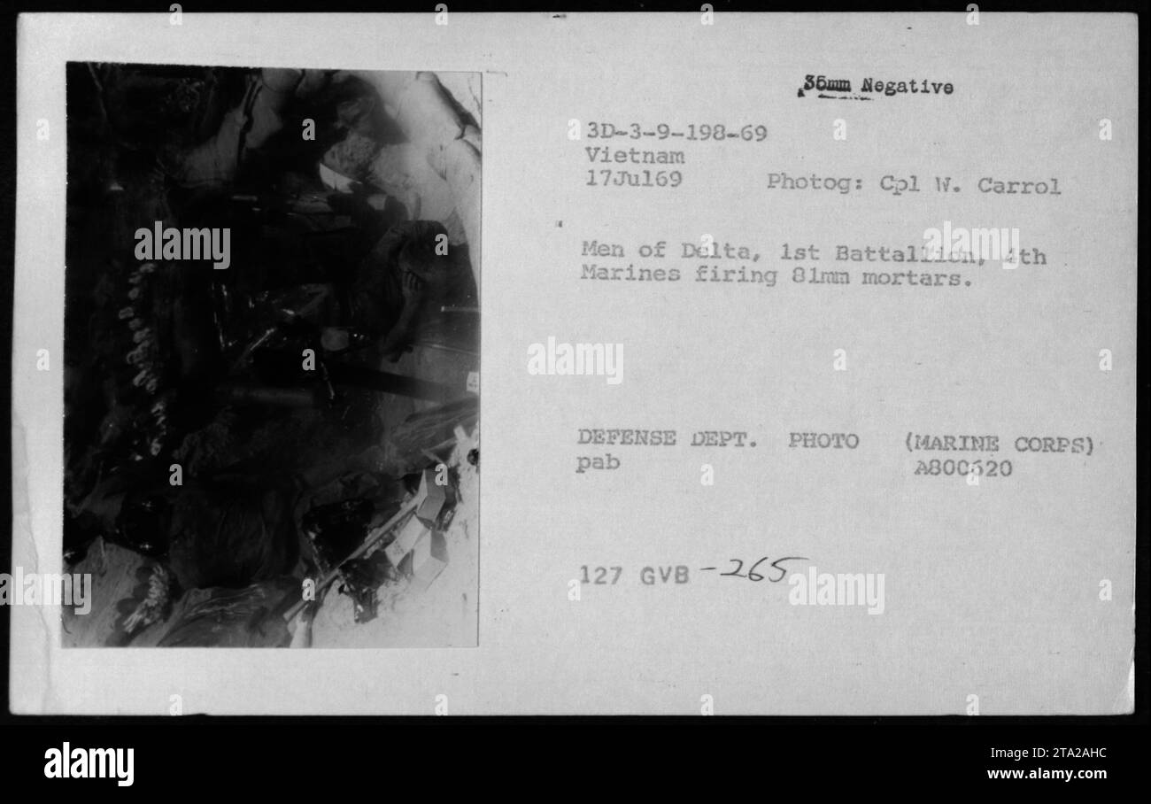 Marines from Delta, 1st Battalion, 4th Marines are photographed firing ...