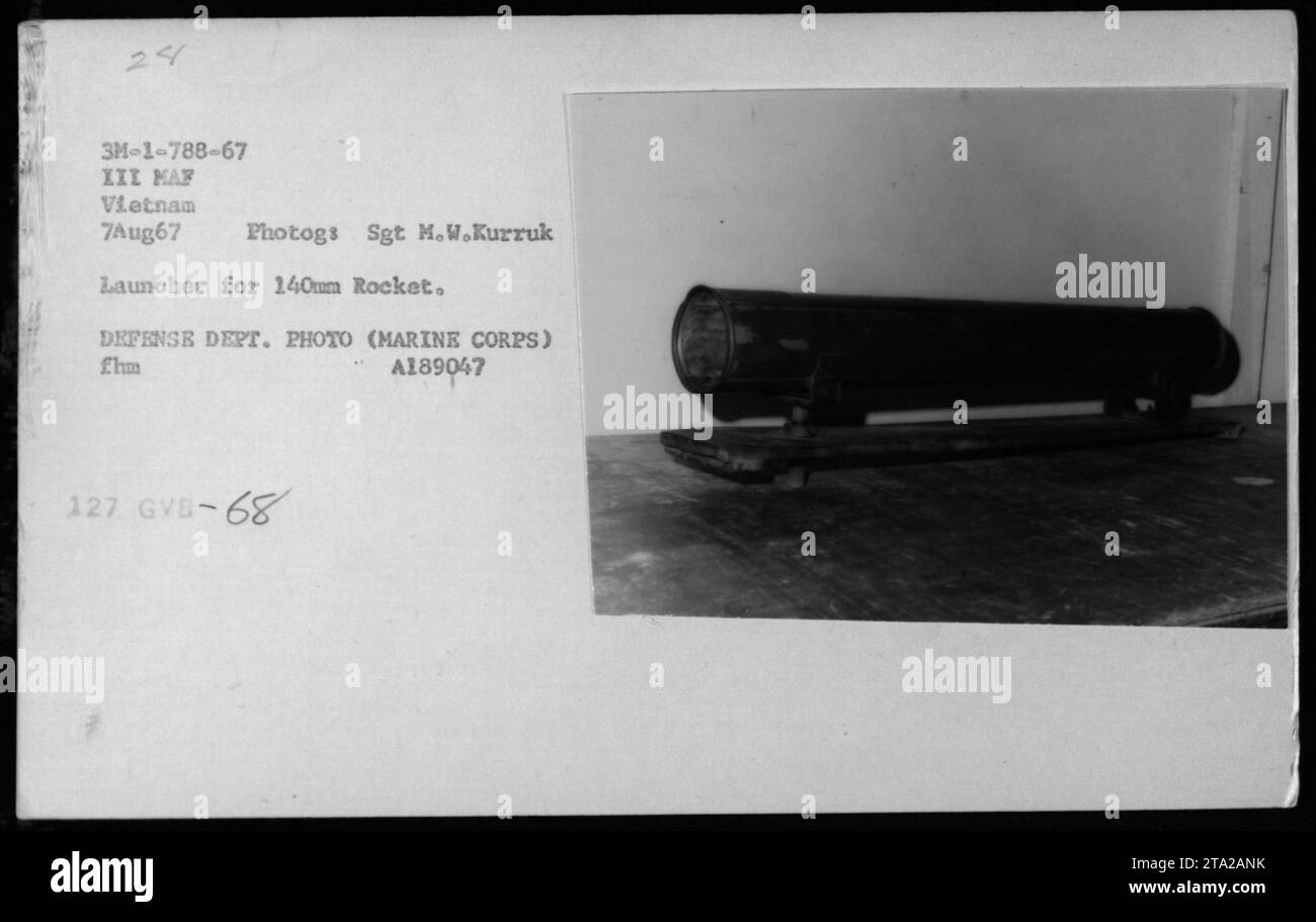 A US Marine inspects a captured 140mm rocket launcher 3M-1-788-67 in ...