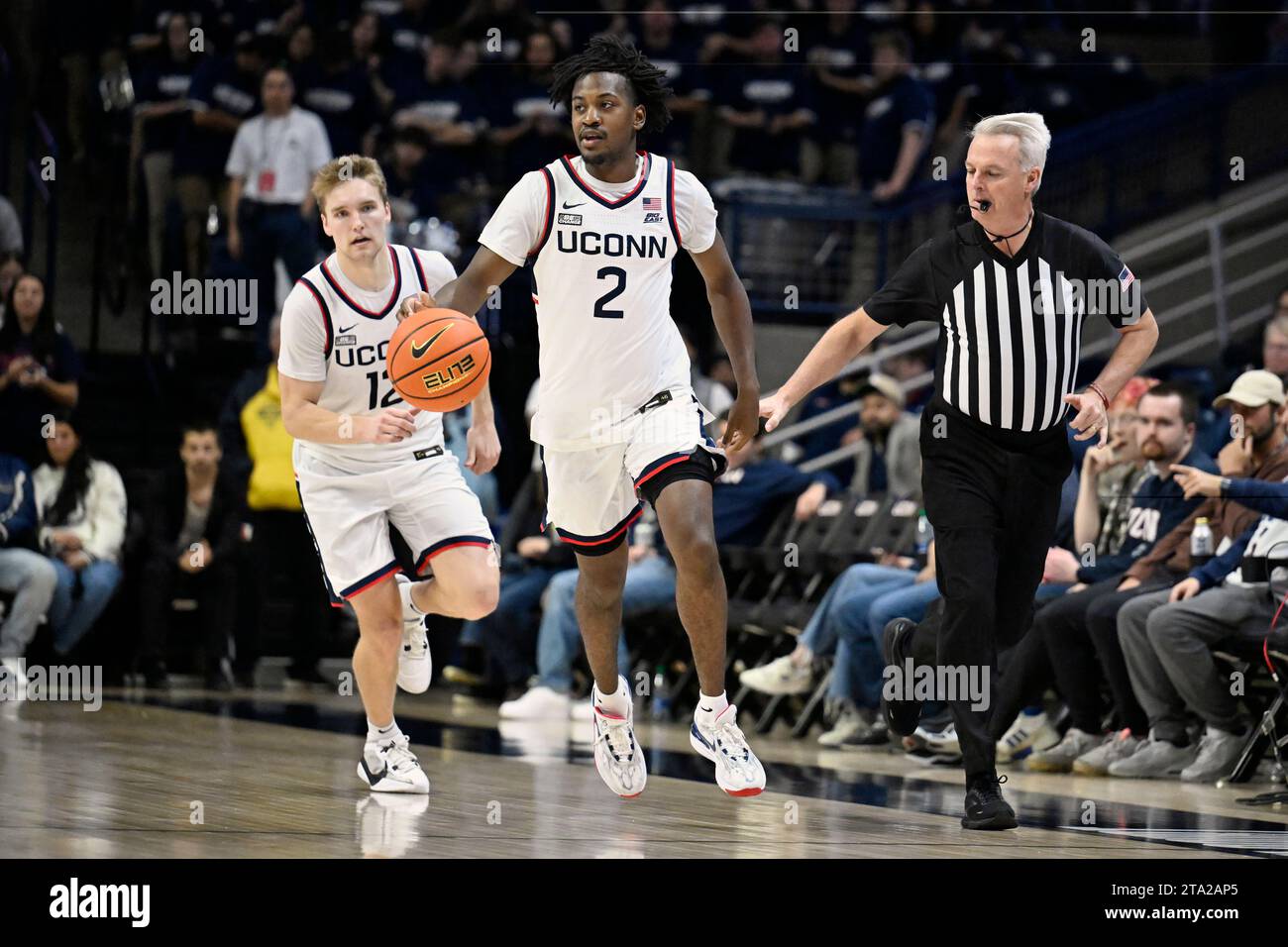 UConn's guard Cam Spencer, left, UConn guard Tristen Newton and ...