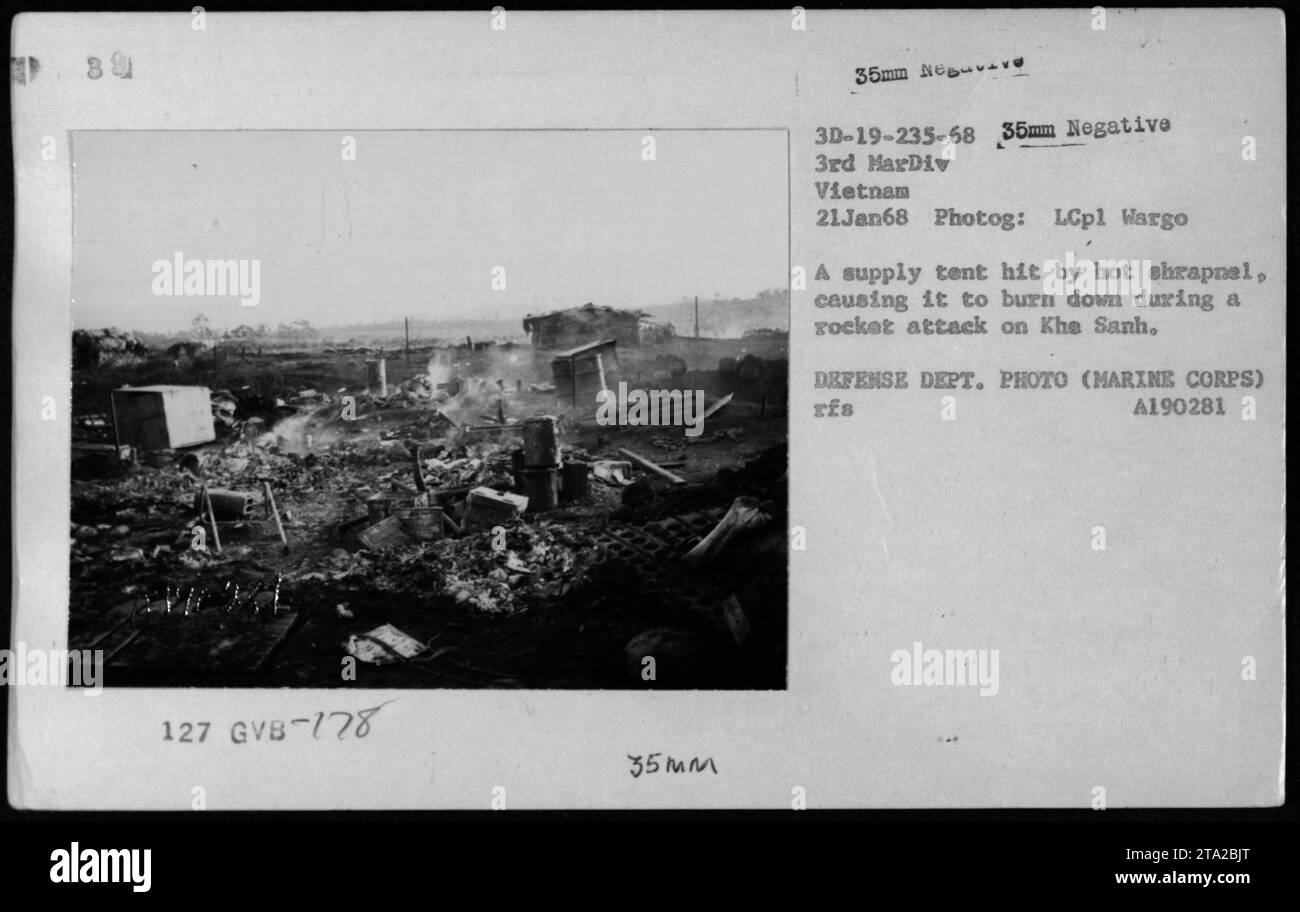 A supply tent at Khe Sanh burns down after being hit by hot shrapnel ...