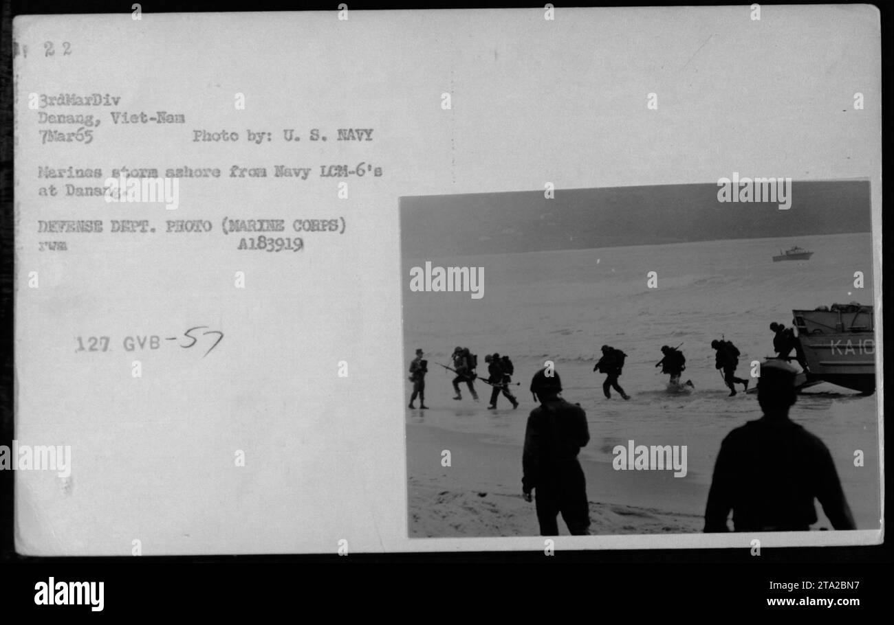 US Navy personnel unloading supplies and equipment from Navy LCM-6 ...