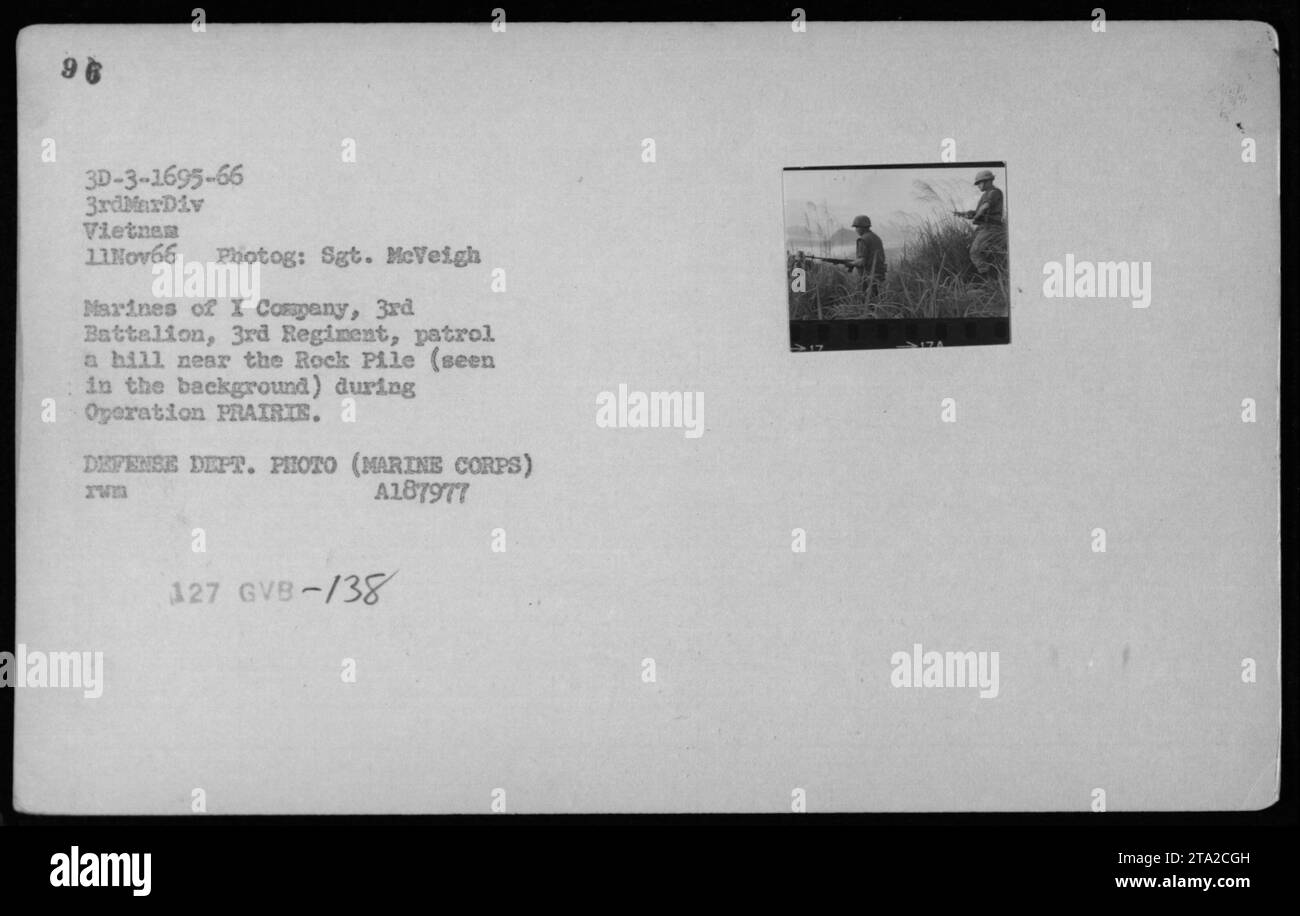 Marines from I Company, 3rd Battalion, 3rd Regiment, navigate a hill ...