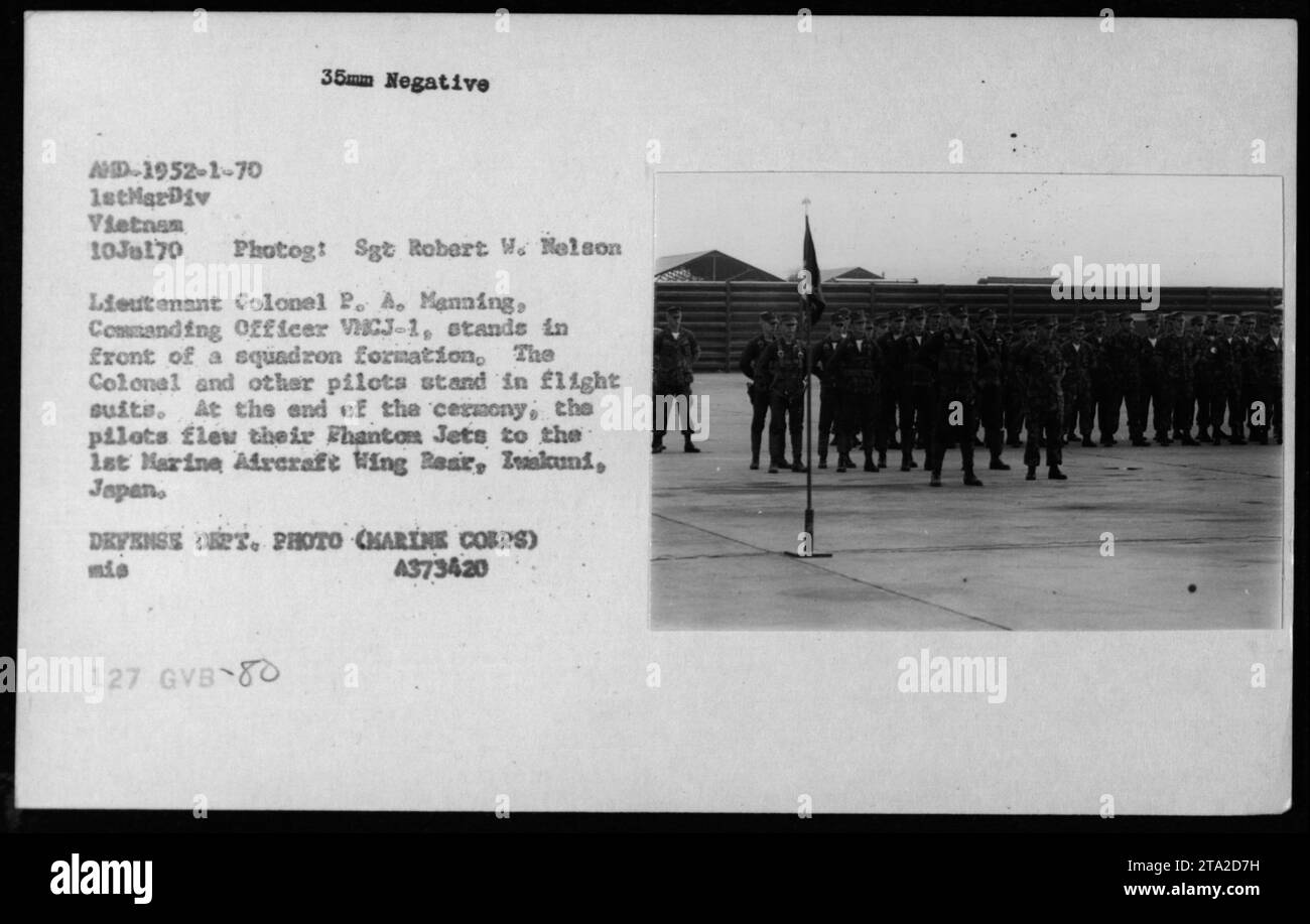 Lieutenant Colonel P.A. Manning, Commanding Officer VCJ-1, stood before ...