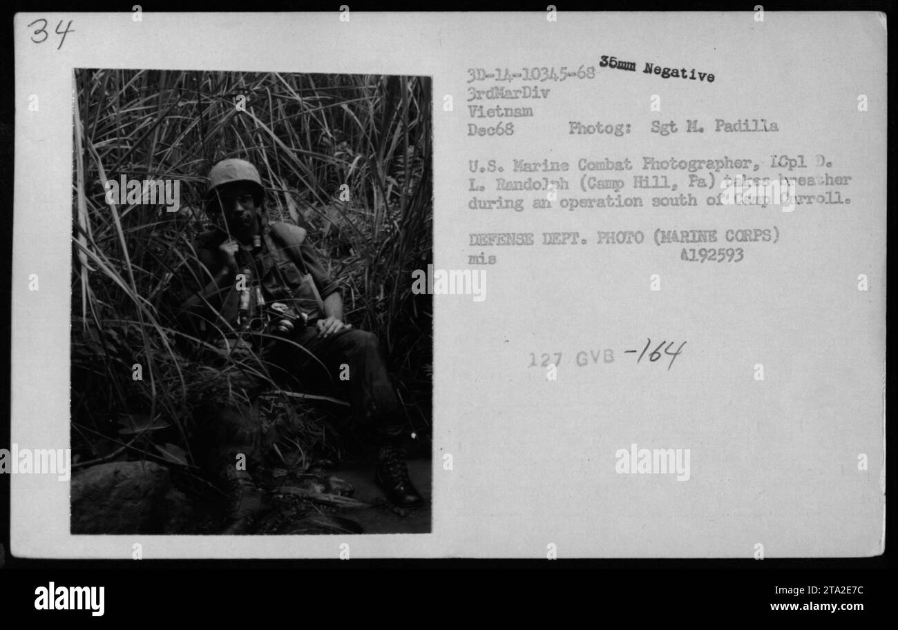 U.S. Marine combat photographer, ICpl D. L. Randolph (from Camp Hill ...