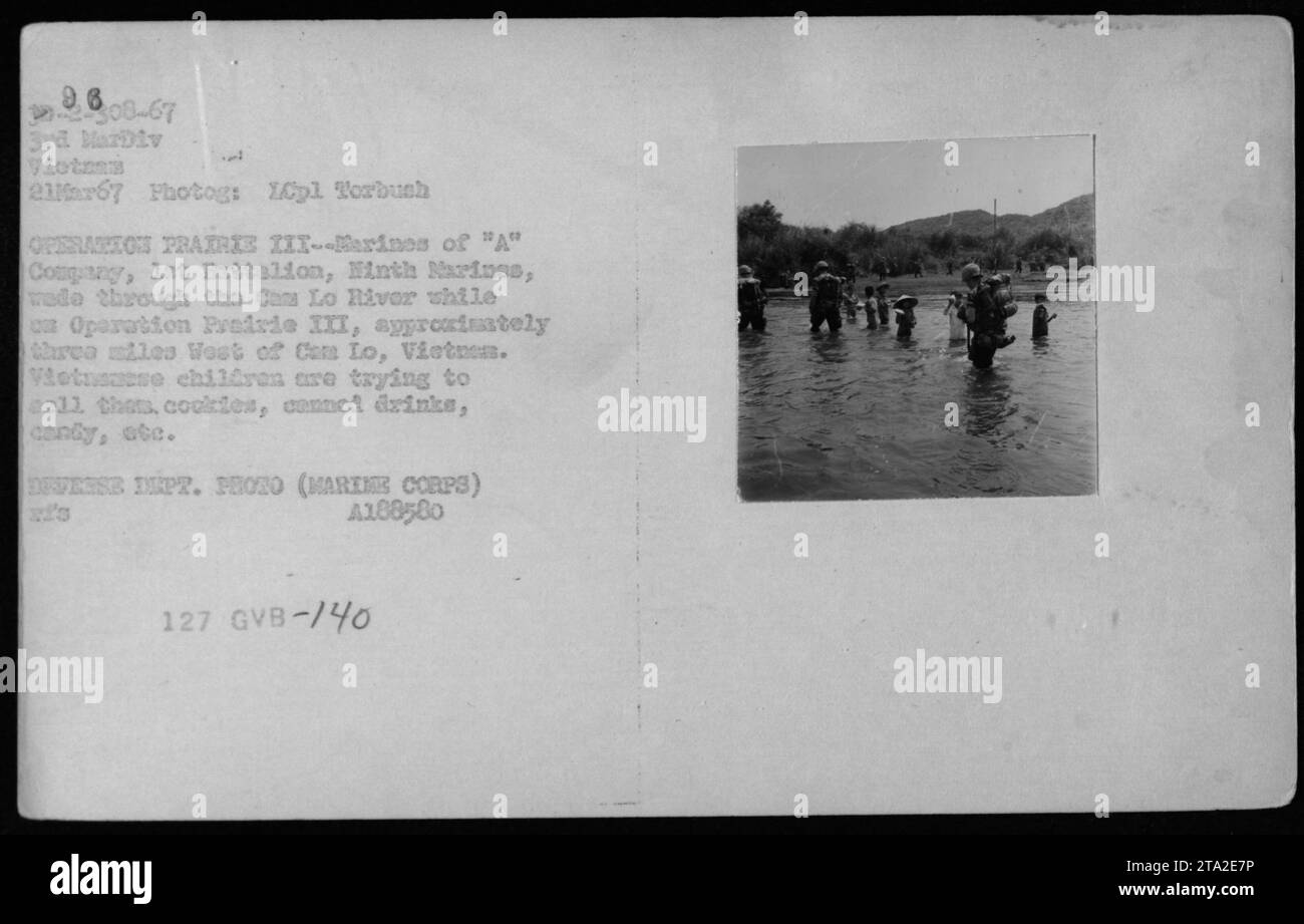 Marines of "A" Company, 3rd Battalion, 4th Marines, wade through the ...