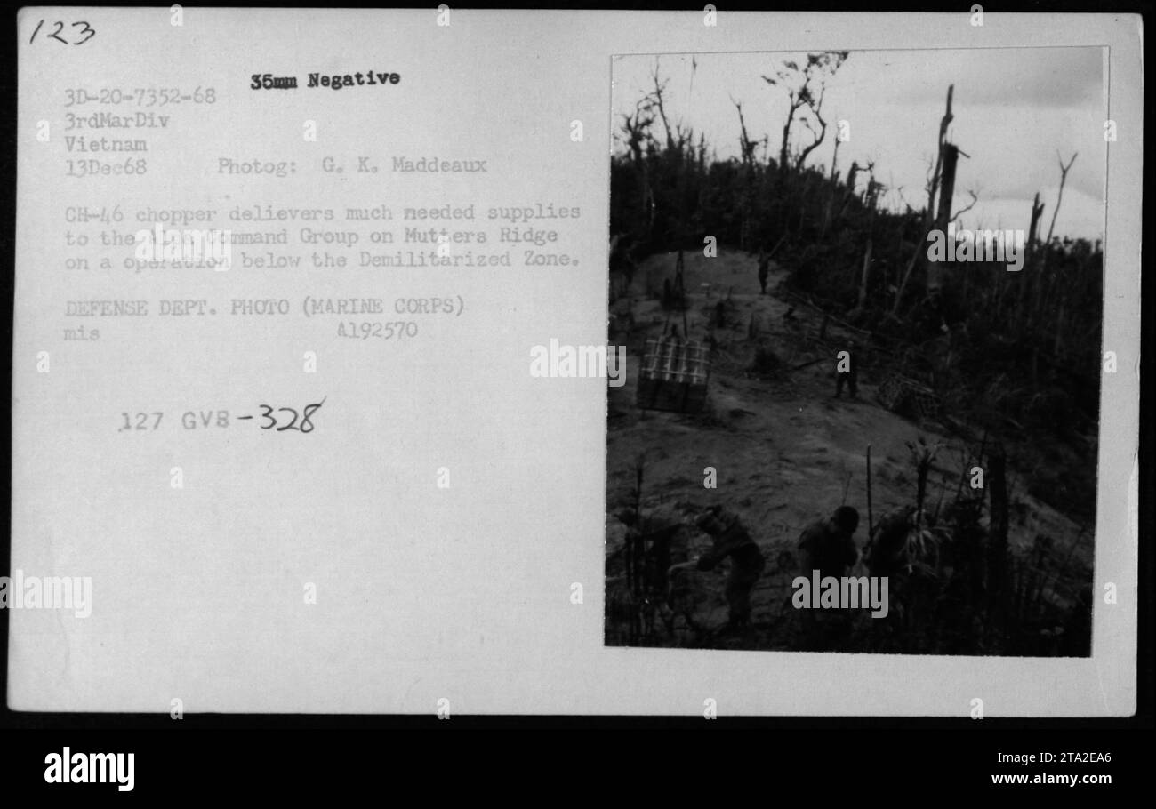 A CH-46 chopper unloads supplies for the Alpha Command Group on Mutters ...