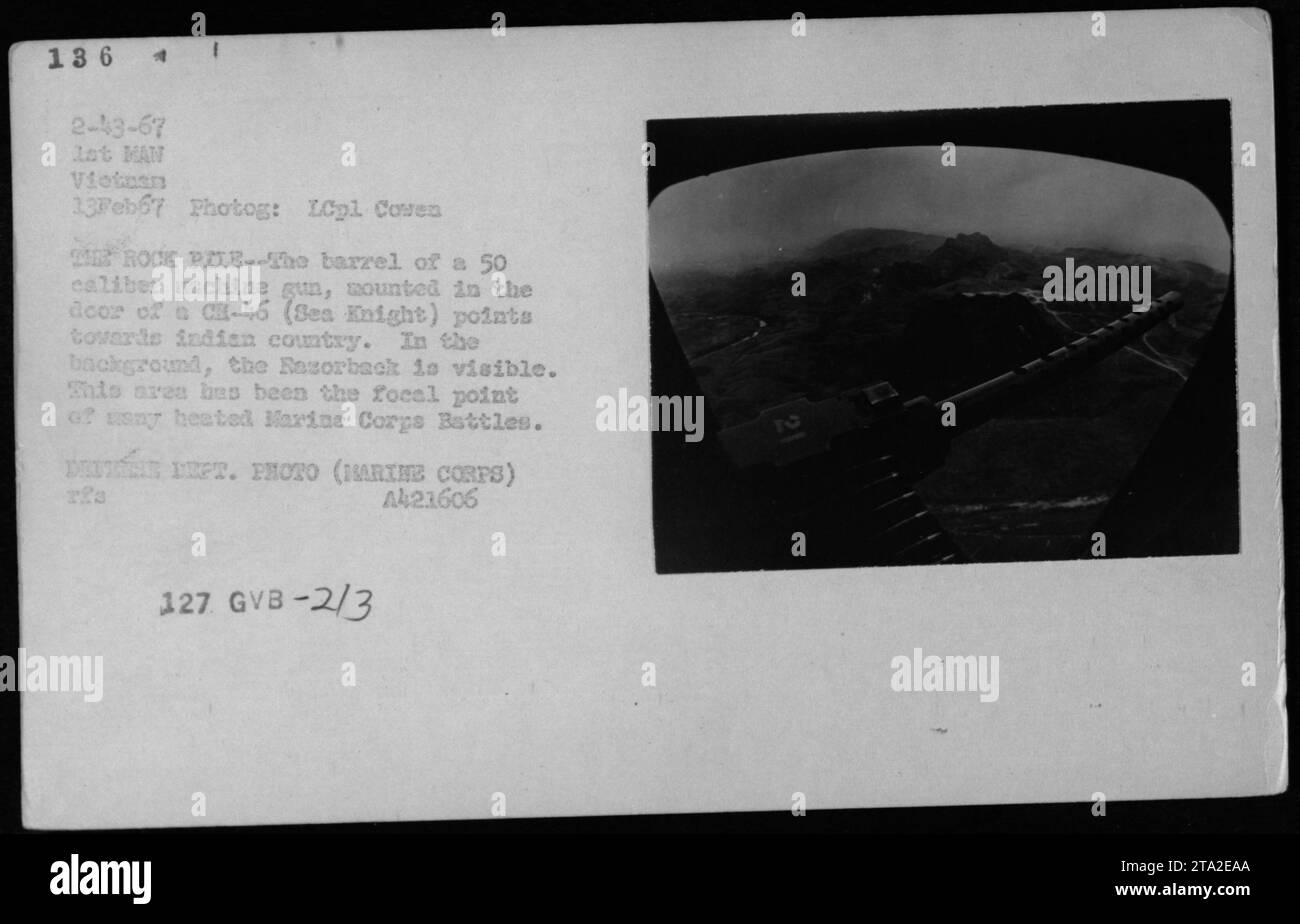 A CH-46 (Sea Knight) helicopter with a 50 caliber machine gun mounted ...