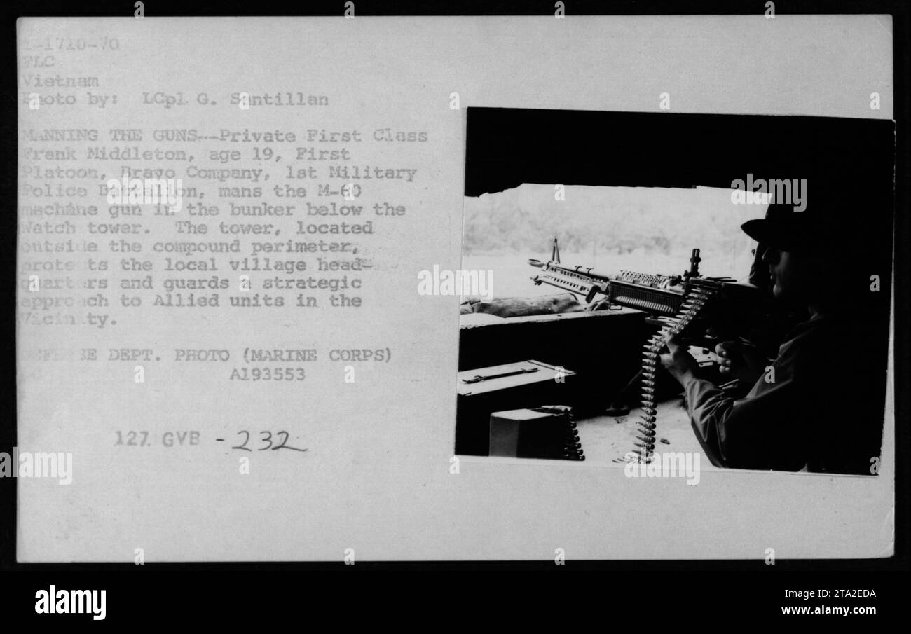 PFC Frank Middleton mans an M-60 machine gun in a bunker below a ...