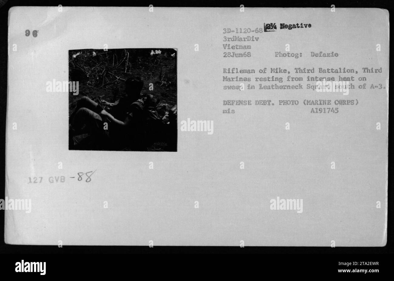 A Marine rifleman from Mike Company, 3rd Battalion, 3rd Marines rests ...