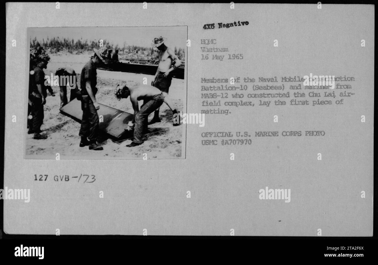 Members of the Naval Mobile Construction Battalion-10 (Seabees) and ...