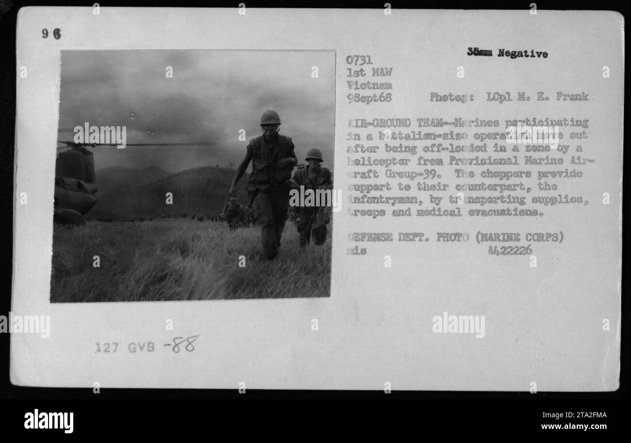 Marines participating in a battalion-size operation move out after ...